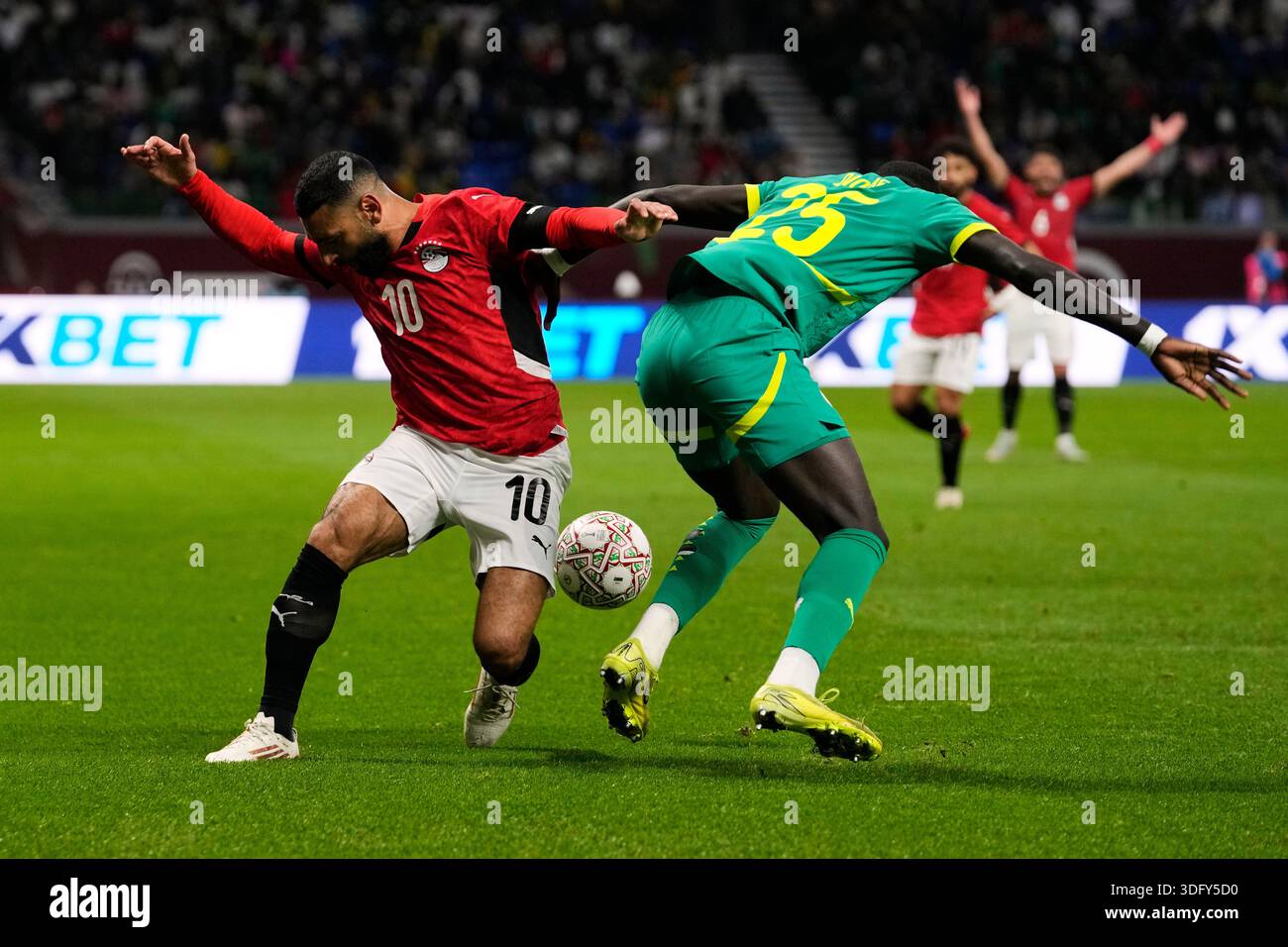 Egypt's Mohamed Salah, left, and Senegal's El Hadji Malick Diouf vie ...