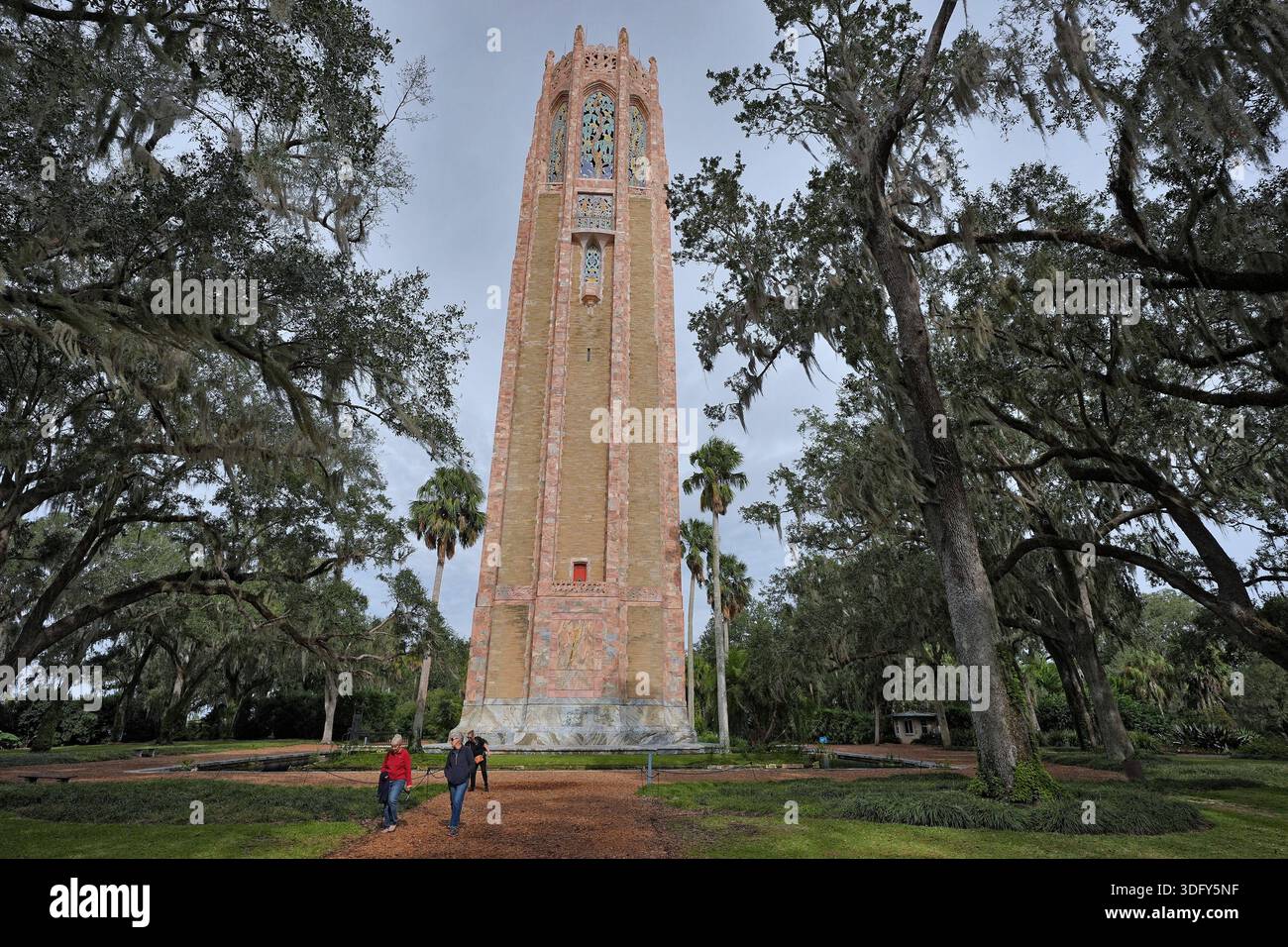 Visitors walk near the singing carillion tower at the Bok Tower Gardens ...