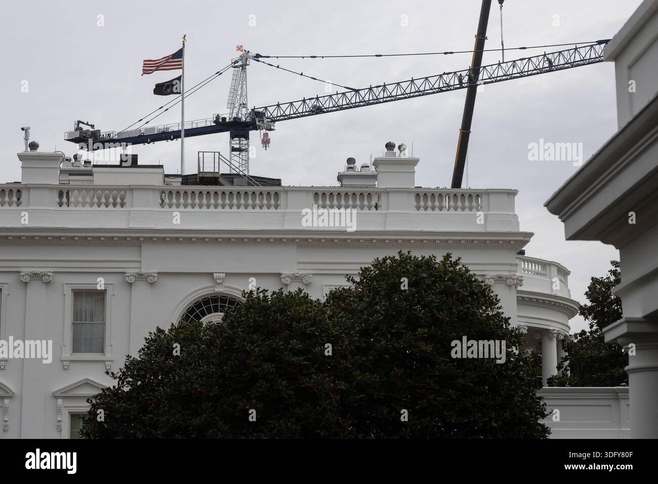 A construction crane is seen outside the White House Jan. 14, 2026 ...