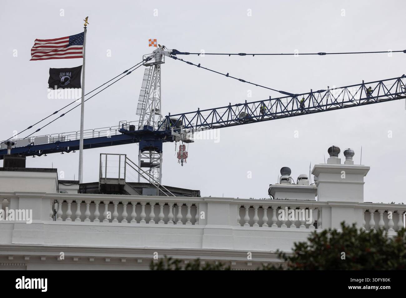 A construction crane is seen outside the White House Jan. 14, 2026 ...