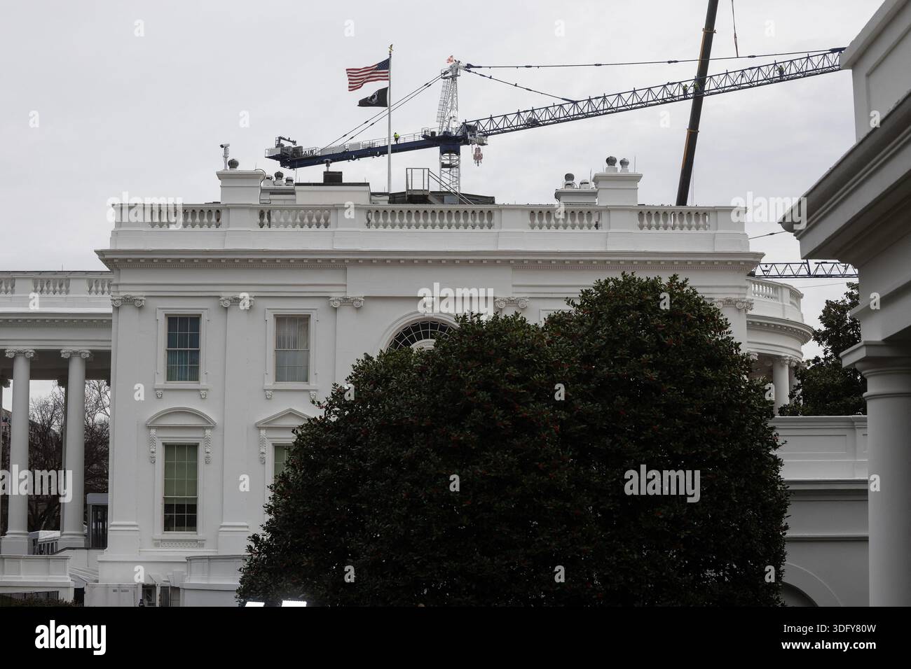A construction crane is seen outside the White House Jan. 14, 2026 ...
