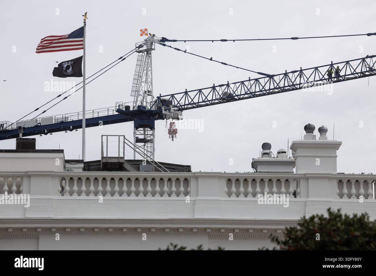 A construction crane is seen outside the White House Jan. 14, 2026 ...