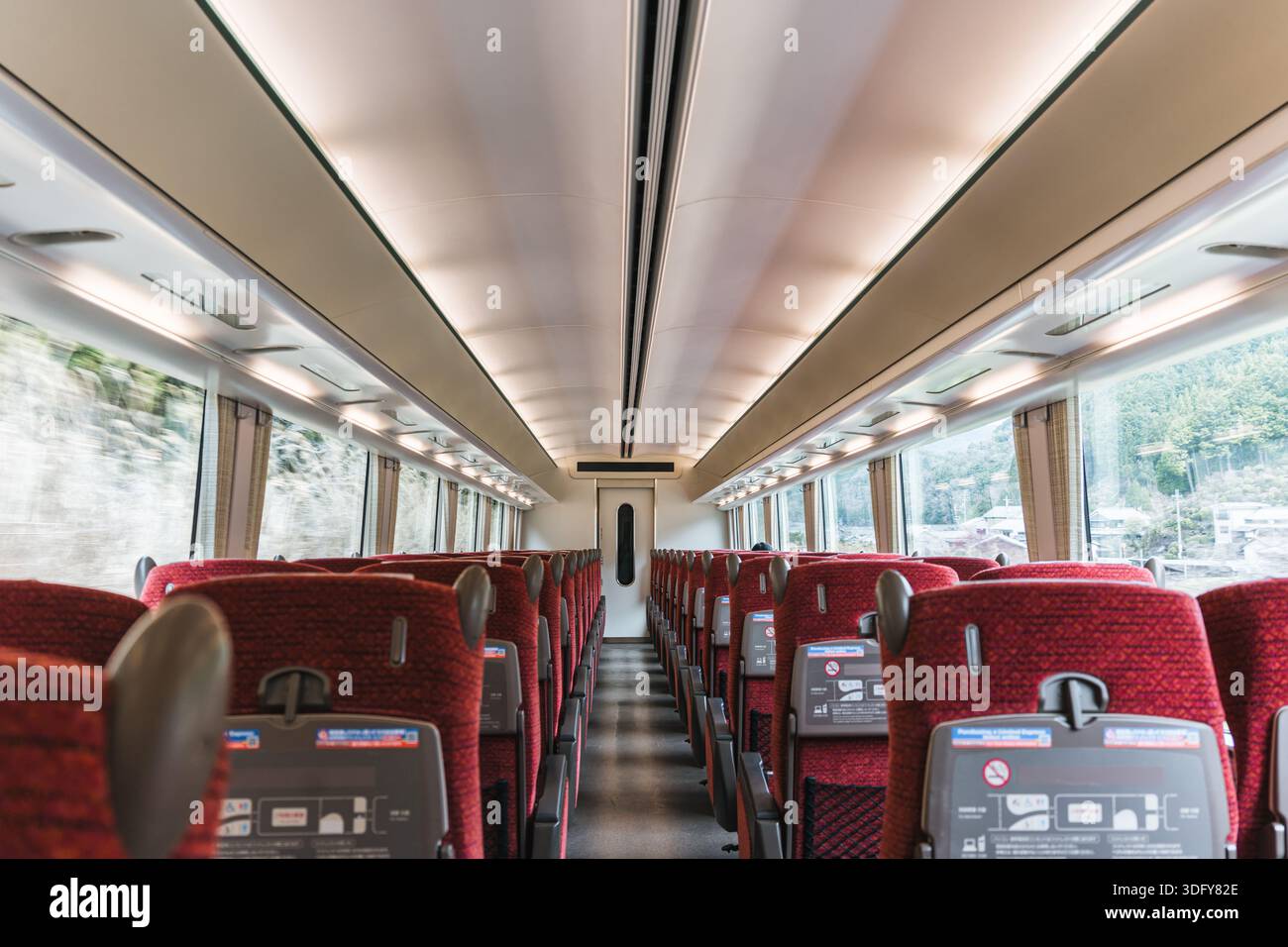 Inside view of modern japanese high speed train carriage with ...