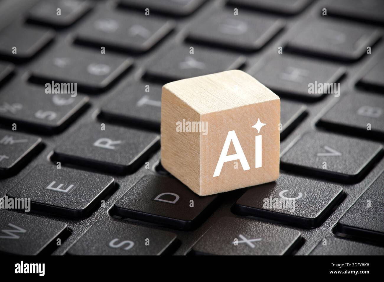 Wooden block with artificial intelligence symbol on computer keyboard ...