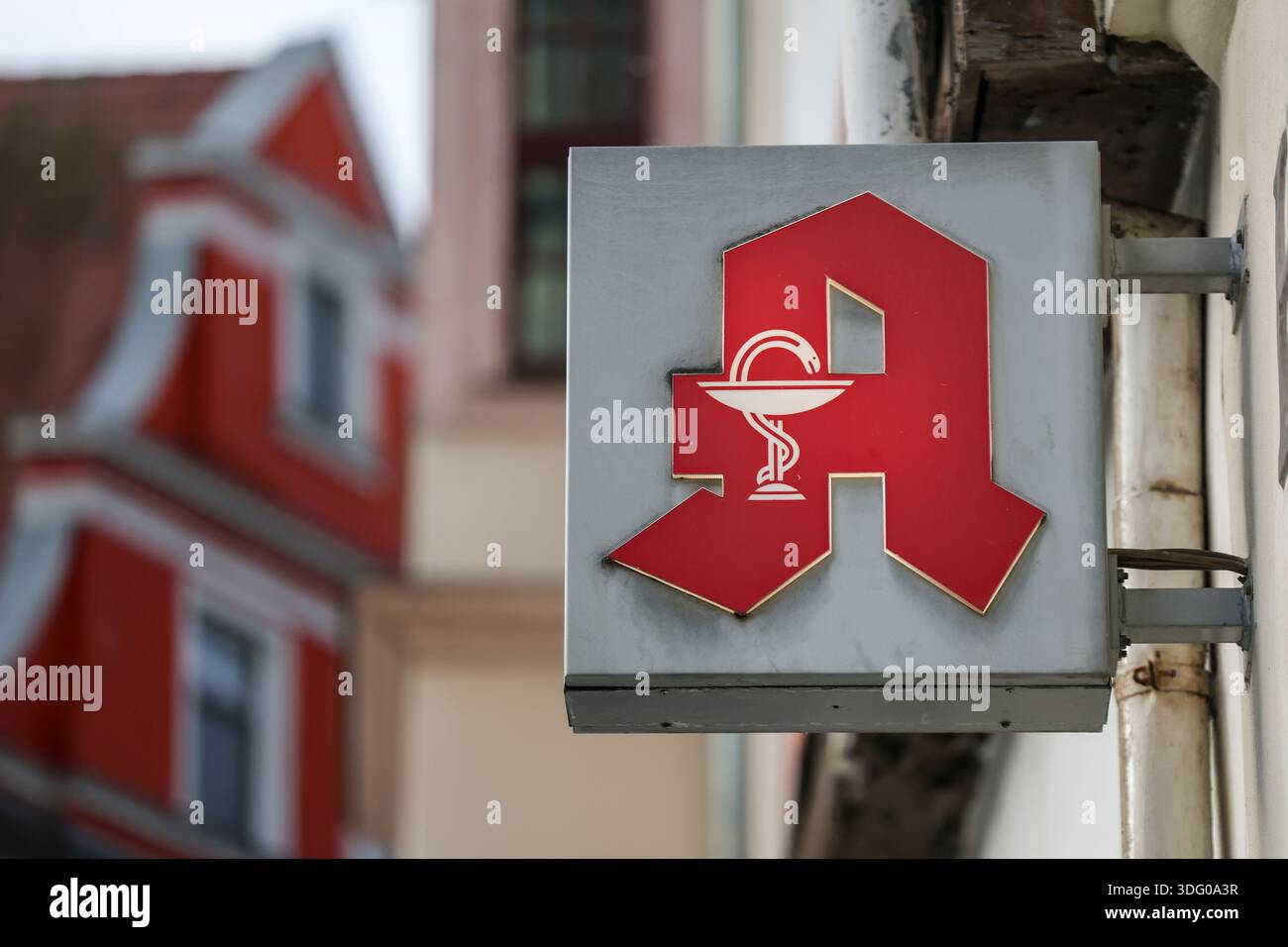13 January 2026, Saxony-Anhalt, Halle: The pharmacy logo with the ...
