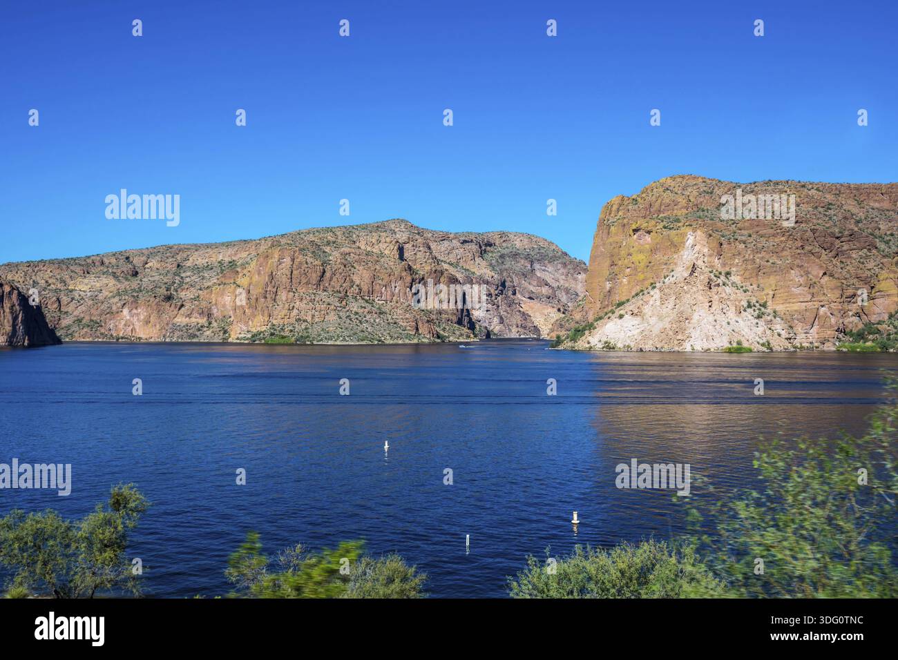 A large refreshing flow of natural water around the desert of Apache ...