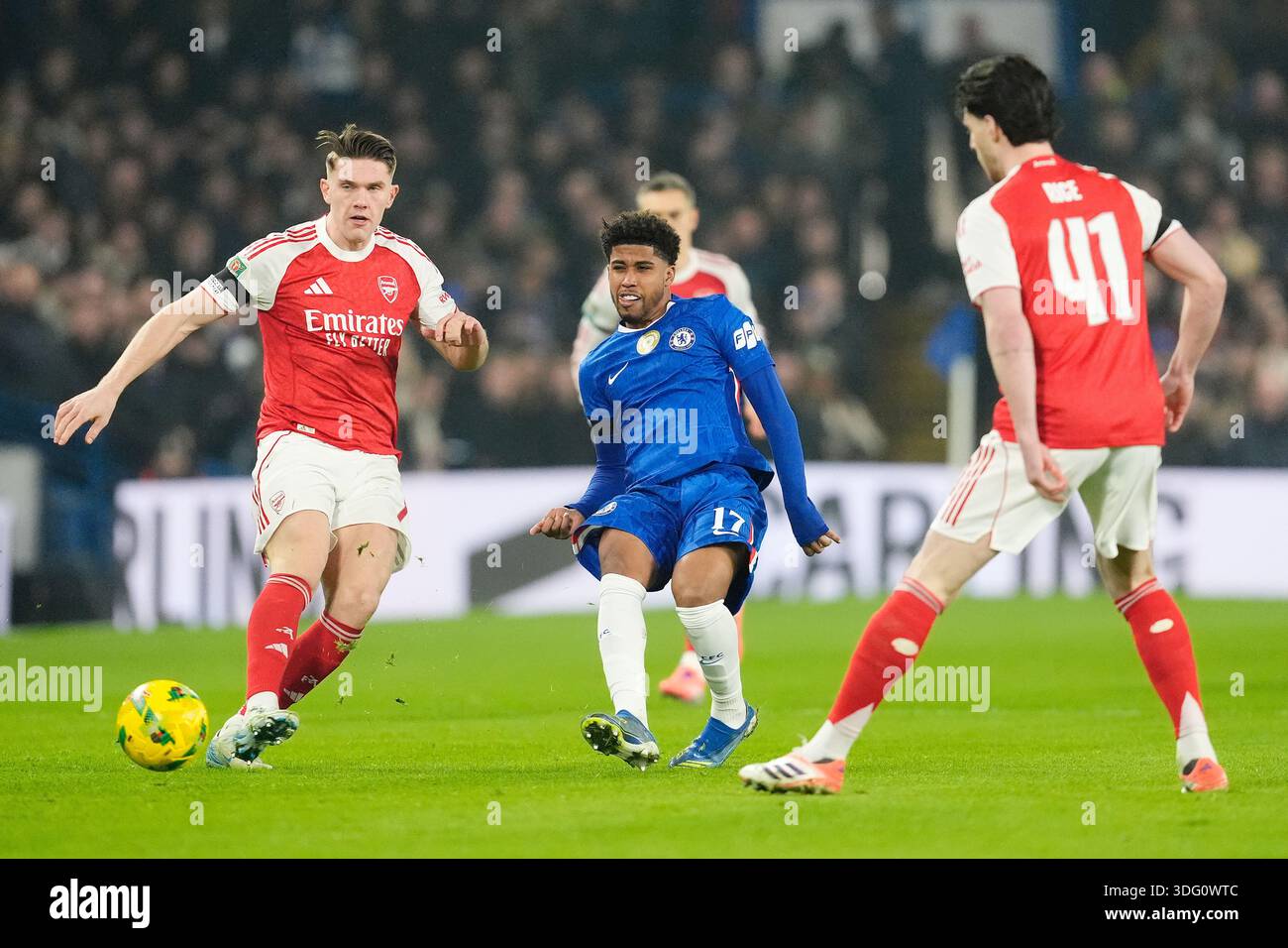 Chelsea's Andrey Santos (centre) battles for the ball with Arsenal's ...