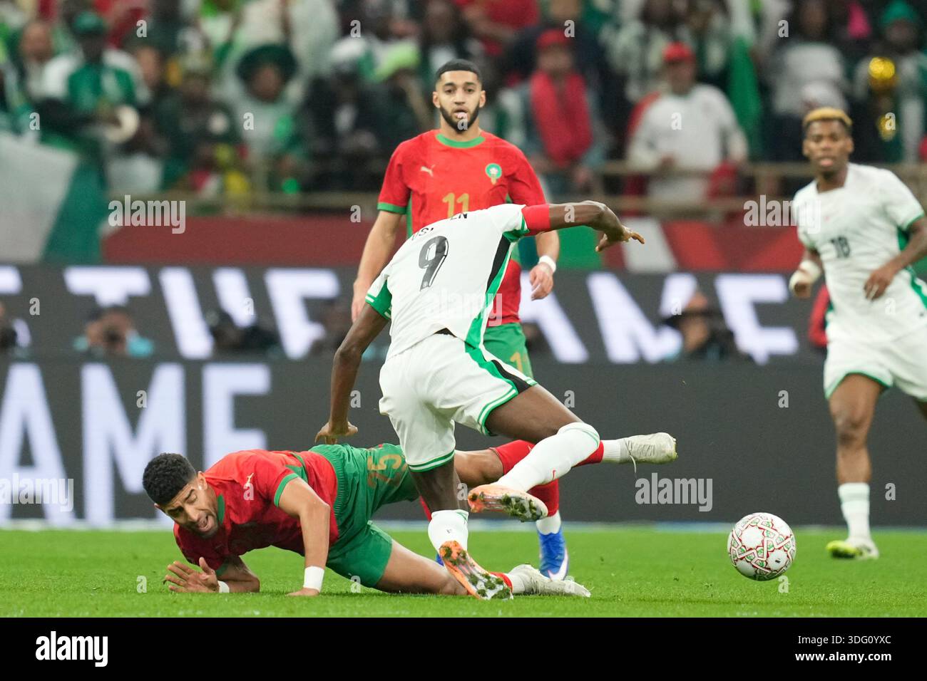 Morocco's Adam Masina, left, and Nigeria's Victor Osimhen fight for the ...