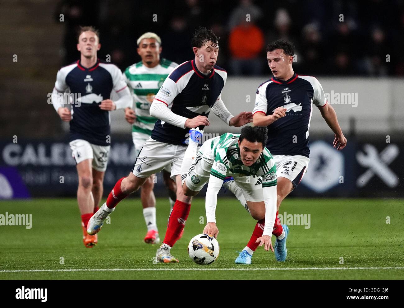 Celtic's Yang Hyun-Jun is challenged by Falkirk's Dylan Tait during the ...