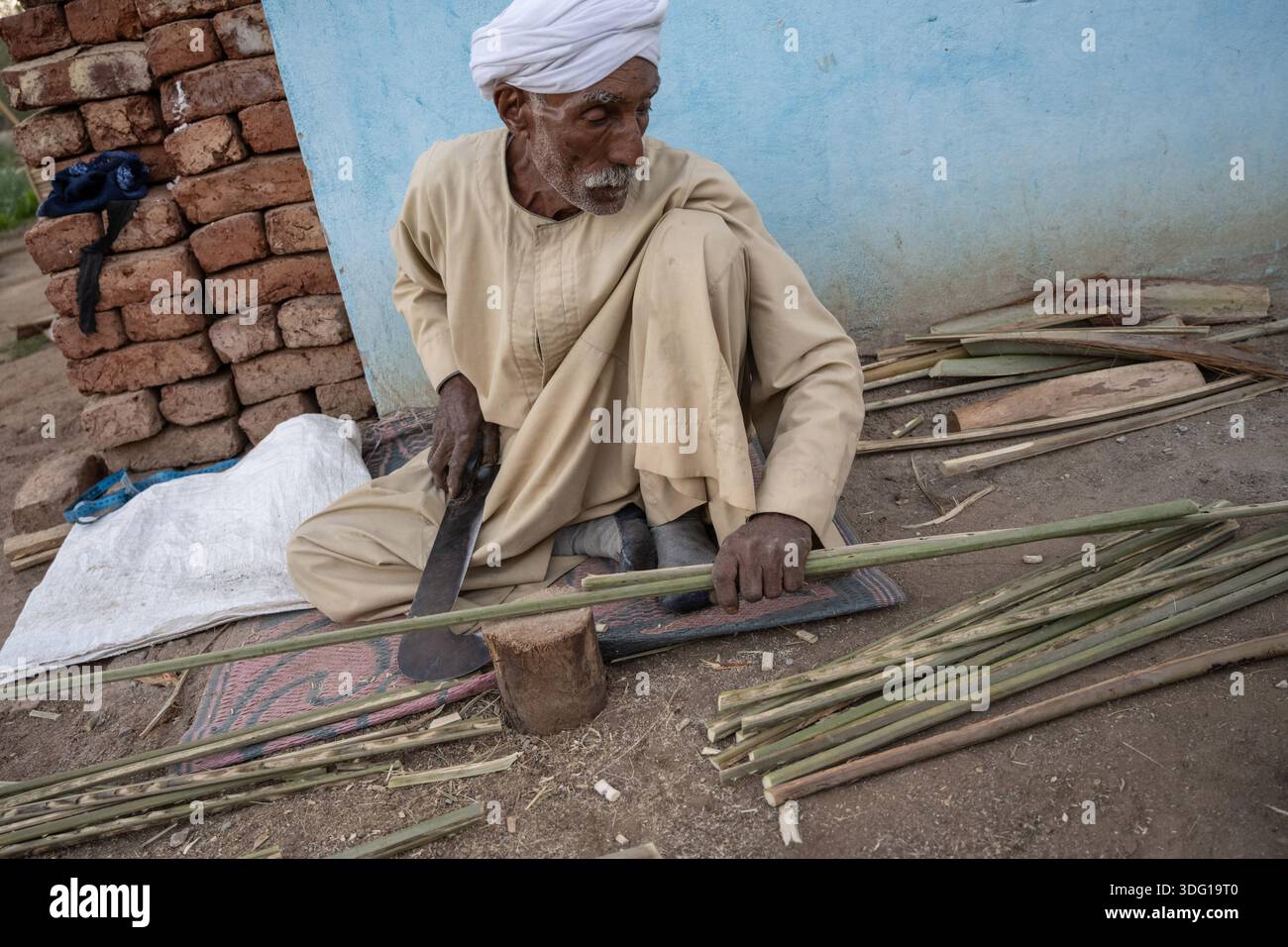 An Egyptian craftsman makes furniture from palm fronds. Natural palm ...