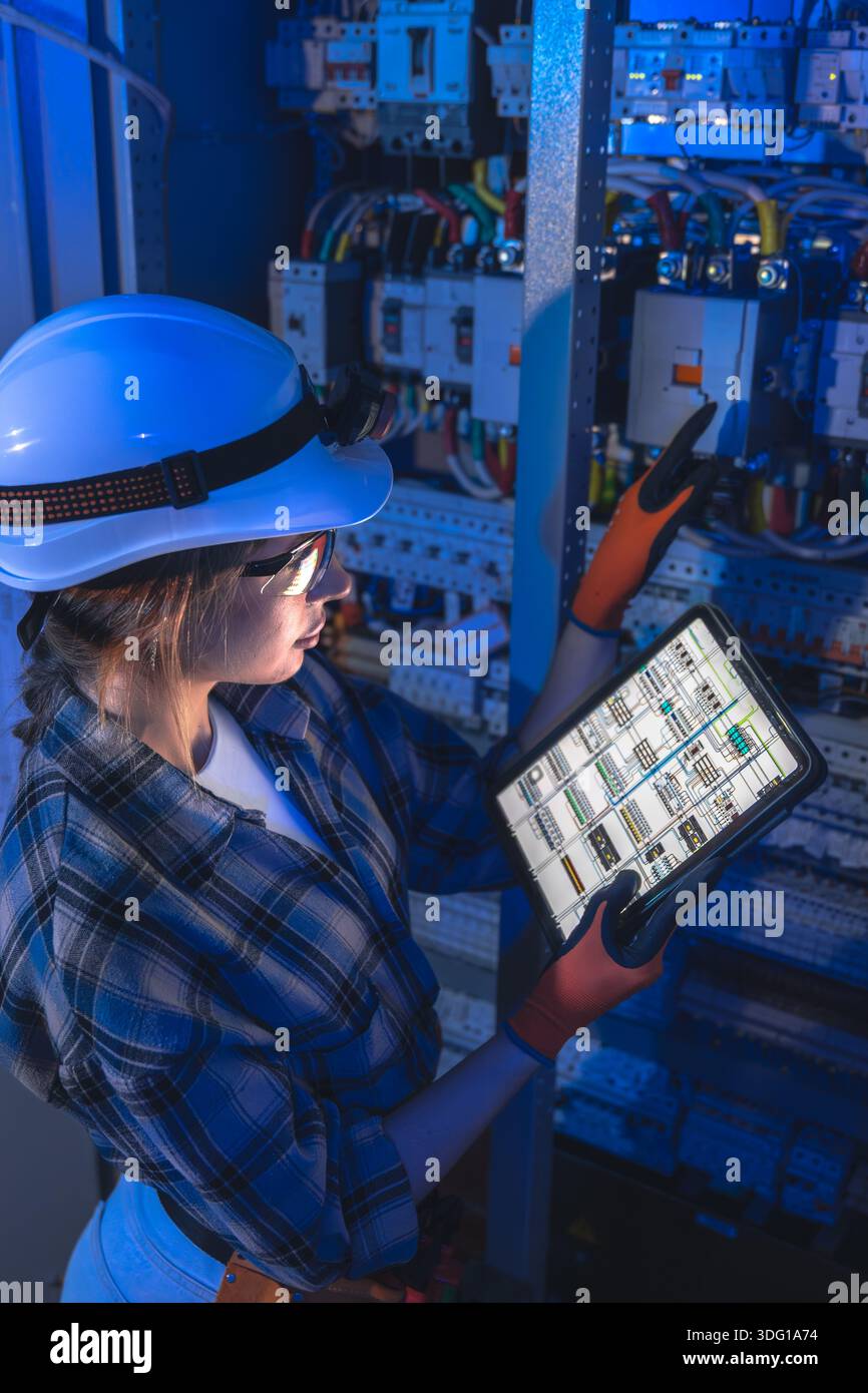 Switchboard check electrician tablet hi-res stock photography and ...