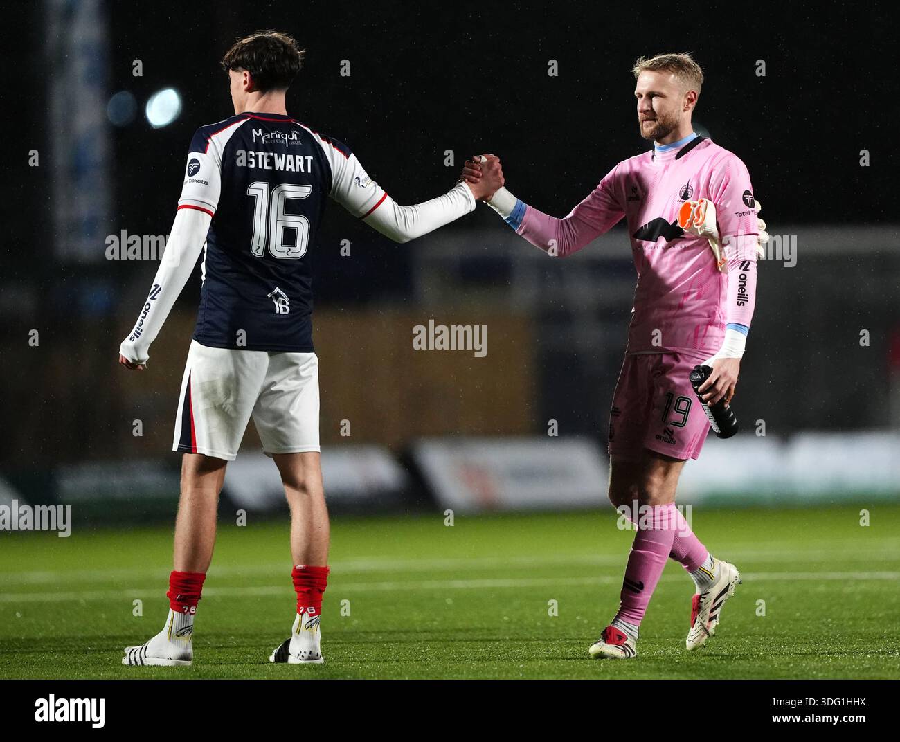 Falkirk's Barney Stewart greets goalkeeper Scott Bain following the ...
