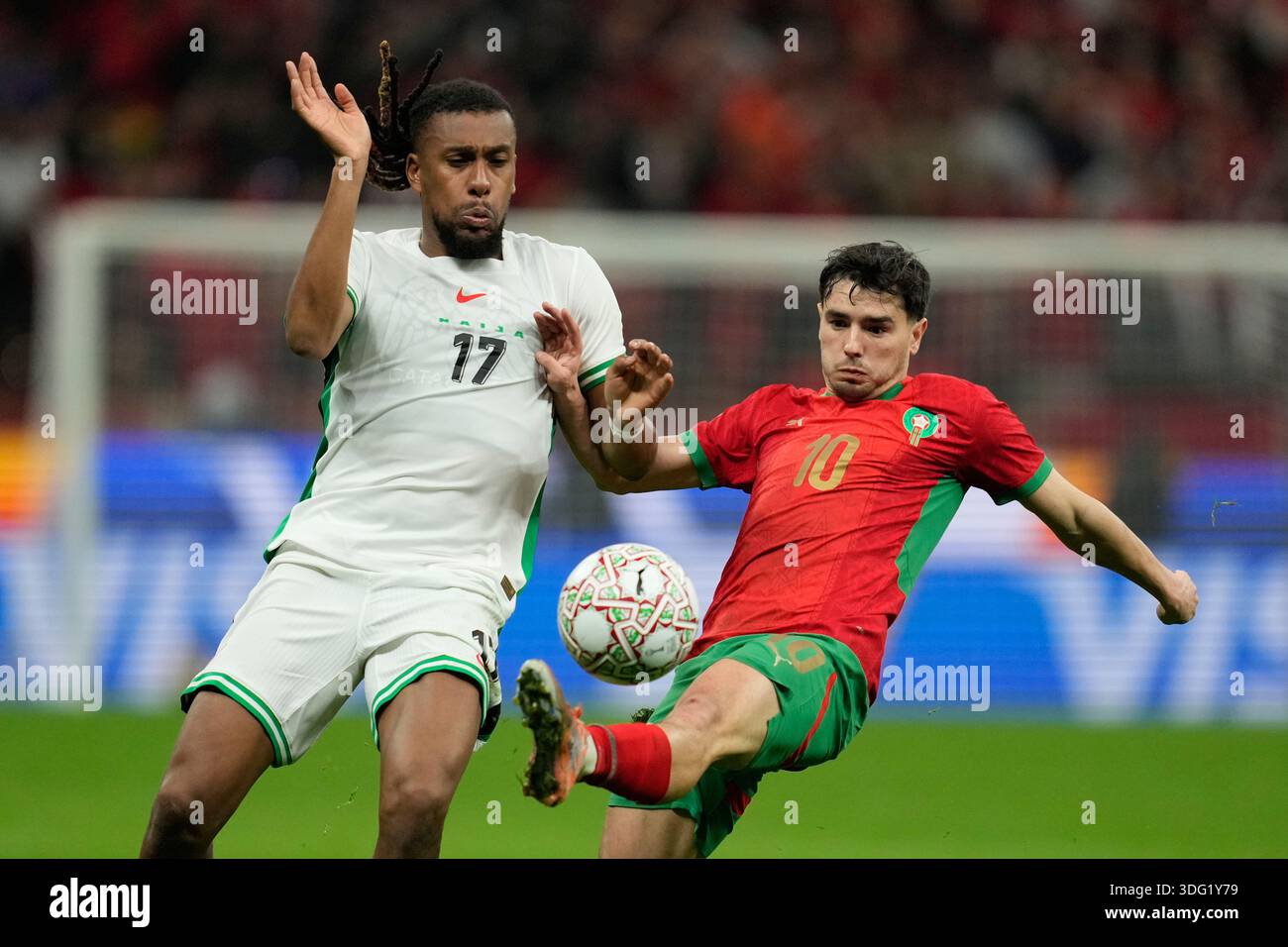 Nigeria's Alex Iwobi , left, and Morocco's Brahim Abdelkader Díaz fight ...