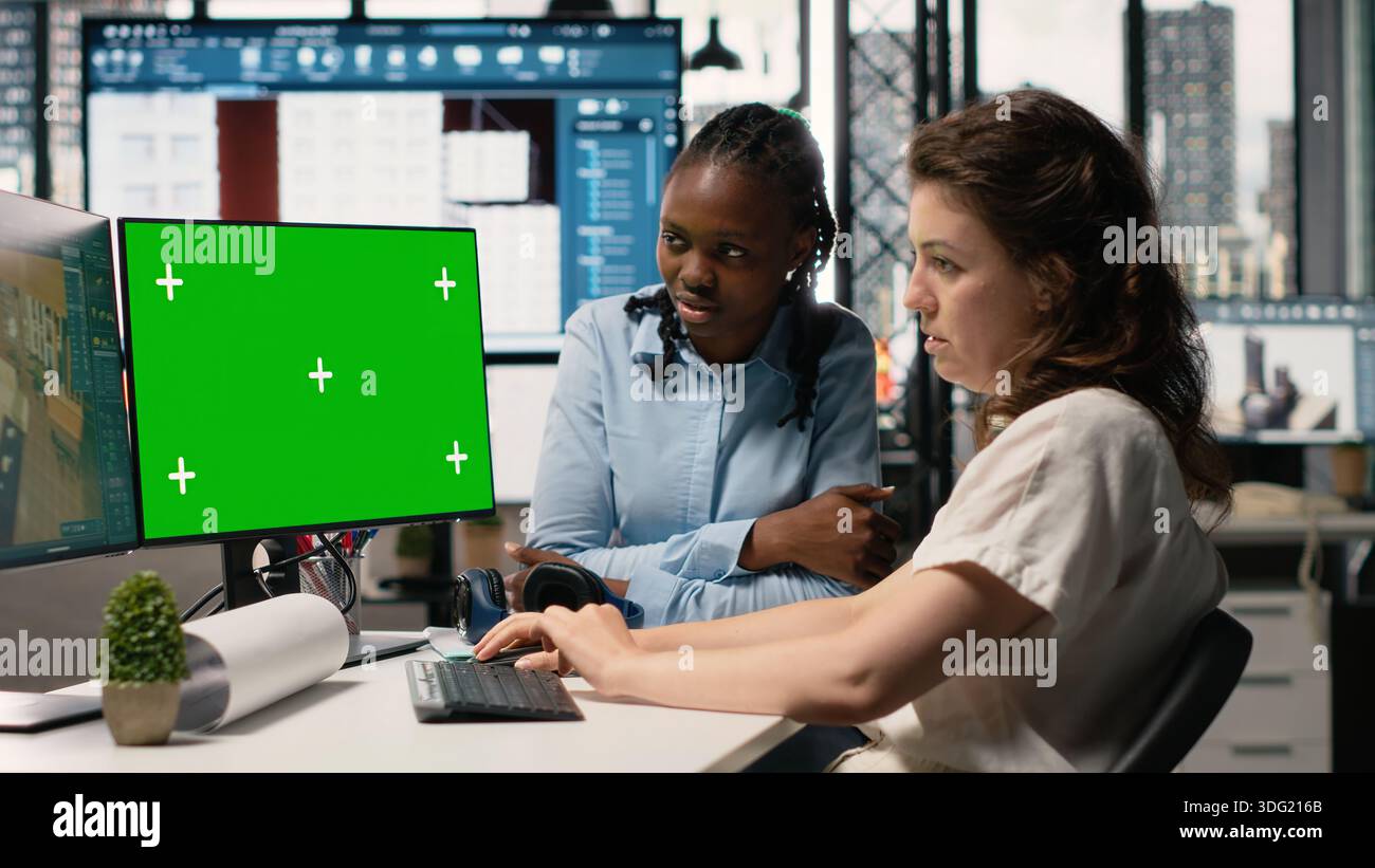 Property developer working with architectural floor plans and mockup ...
