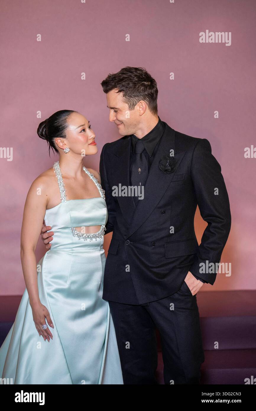 Luke Thompson and Yerin Ha attend the "Bridgerton" Season 4 Paris World ...