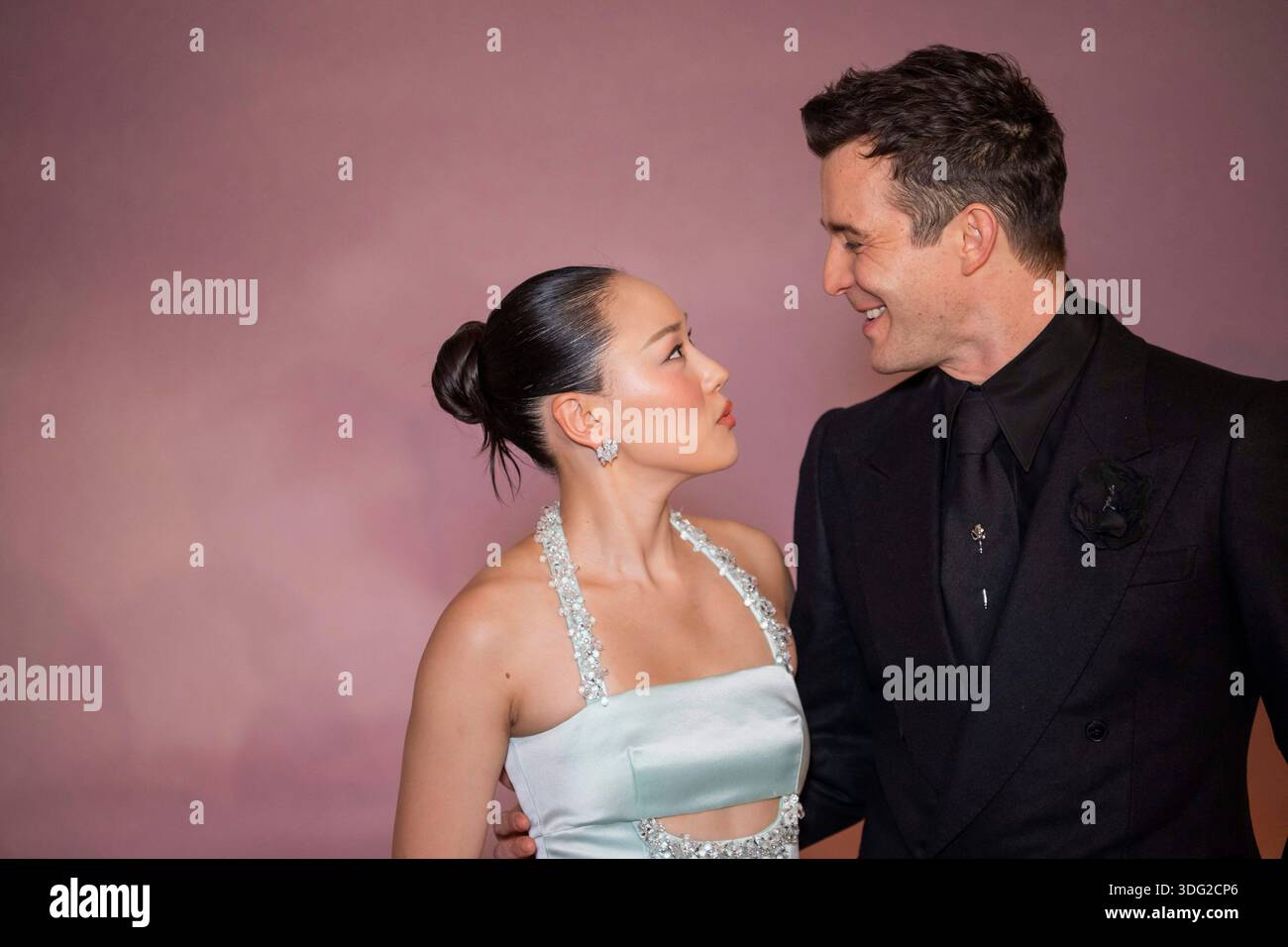 Luke Thompson and Yerin Ha attend the "Bridgerton" Season 4 Paris World ...