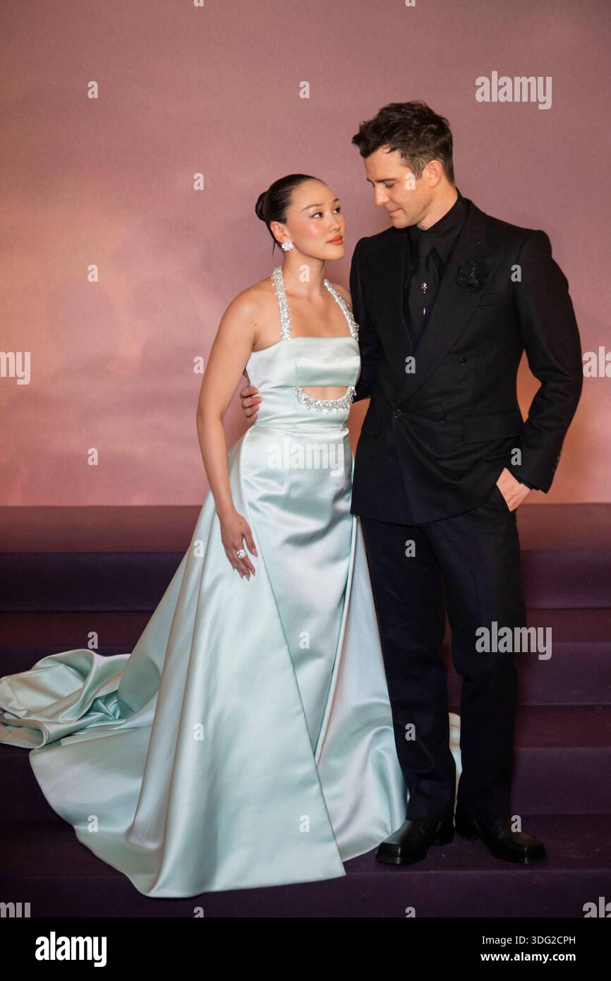 Luke Thompson and Yerin Ha attend the "Bridgerton" Season 4 Paris World ...