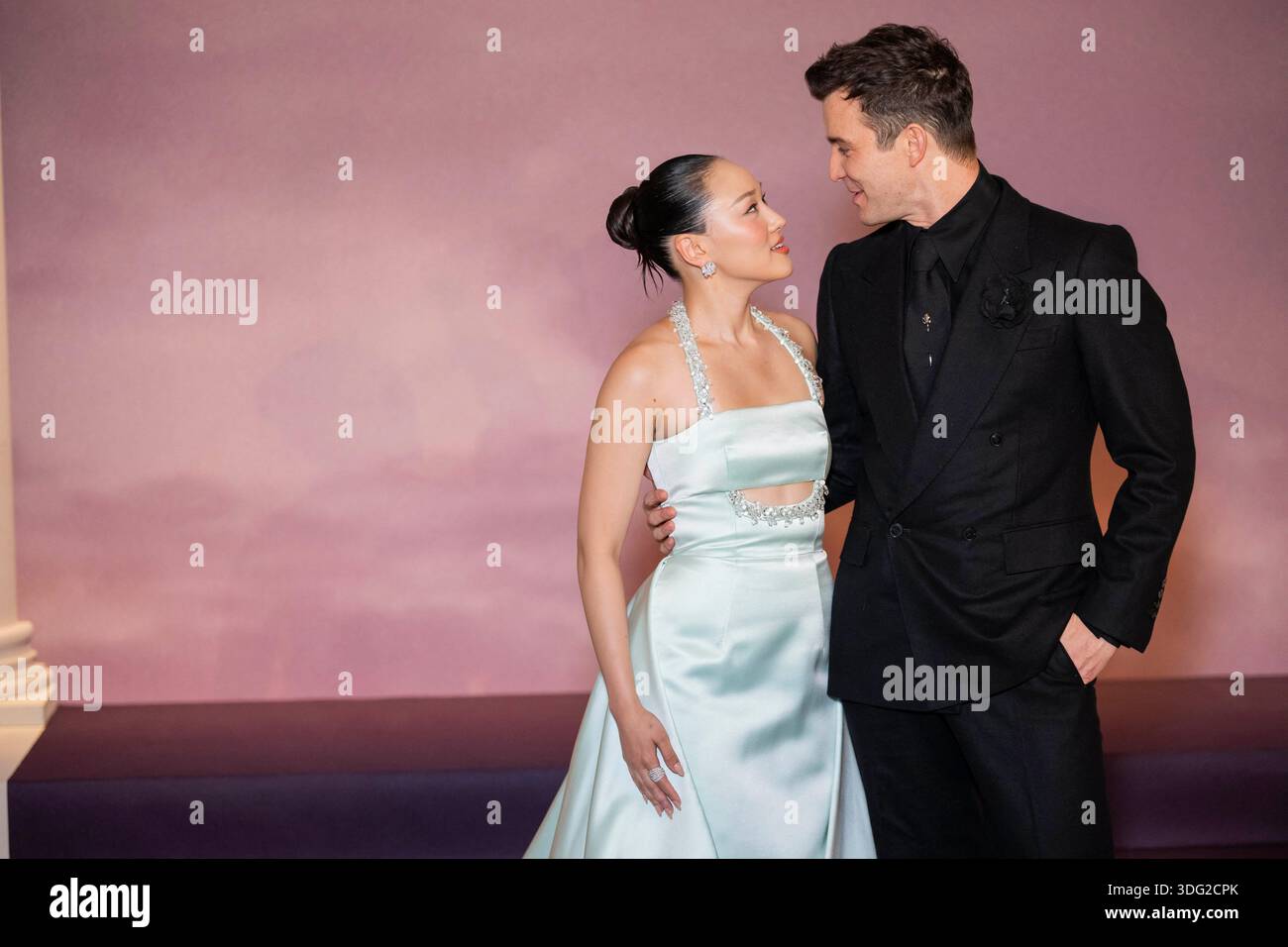 Luke Thompson and Yerin Ha attend the "Bridgerton" Season 4 Paris World ...