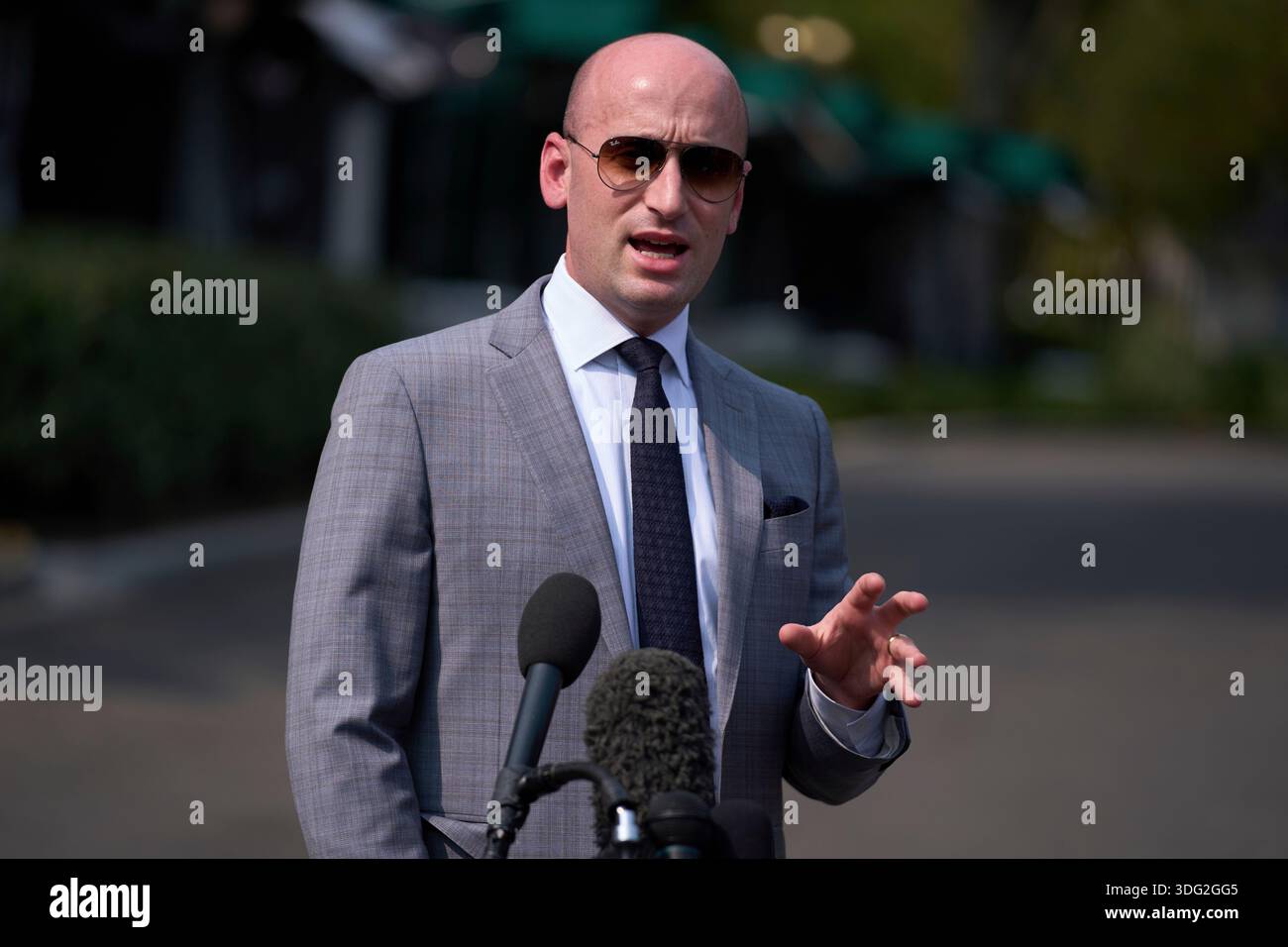 FILE - White House deputy chief of staff Stephen Miller speaks with ...