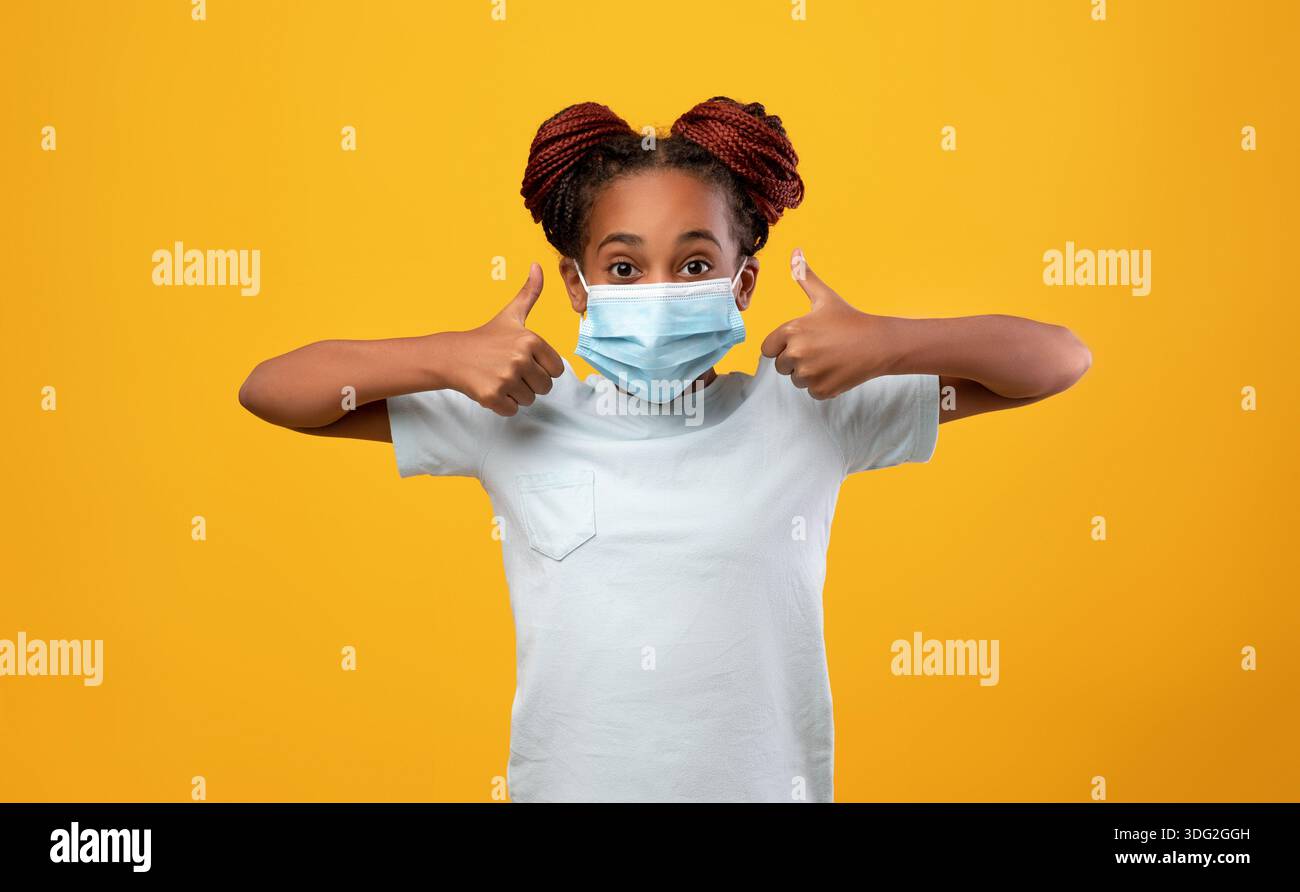 African american child showing thumb hi-res stock photography and ...