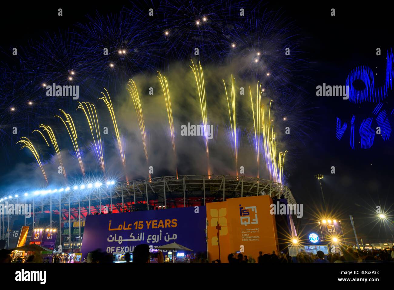 Doha, Qatar. 14th Jan, 2026. Spectators watch fireworks and a drone ...