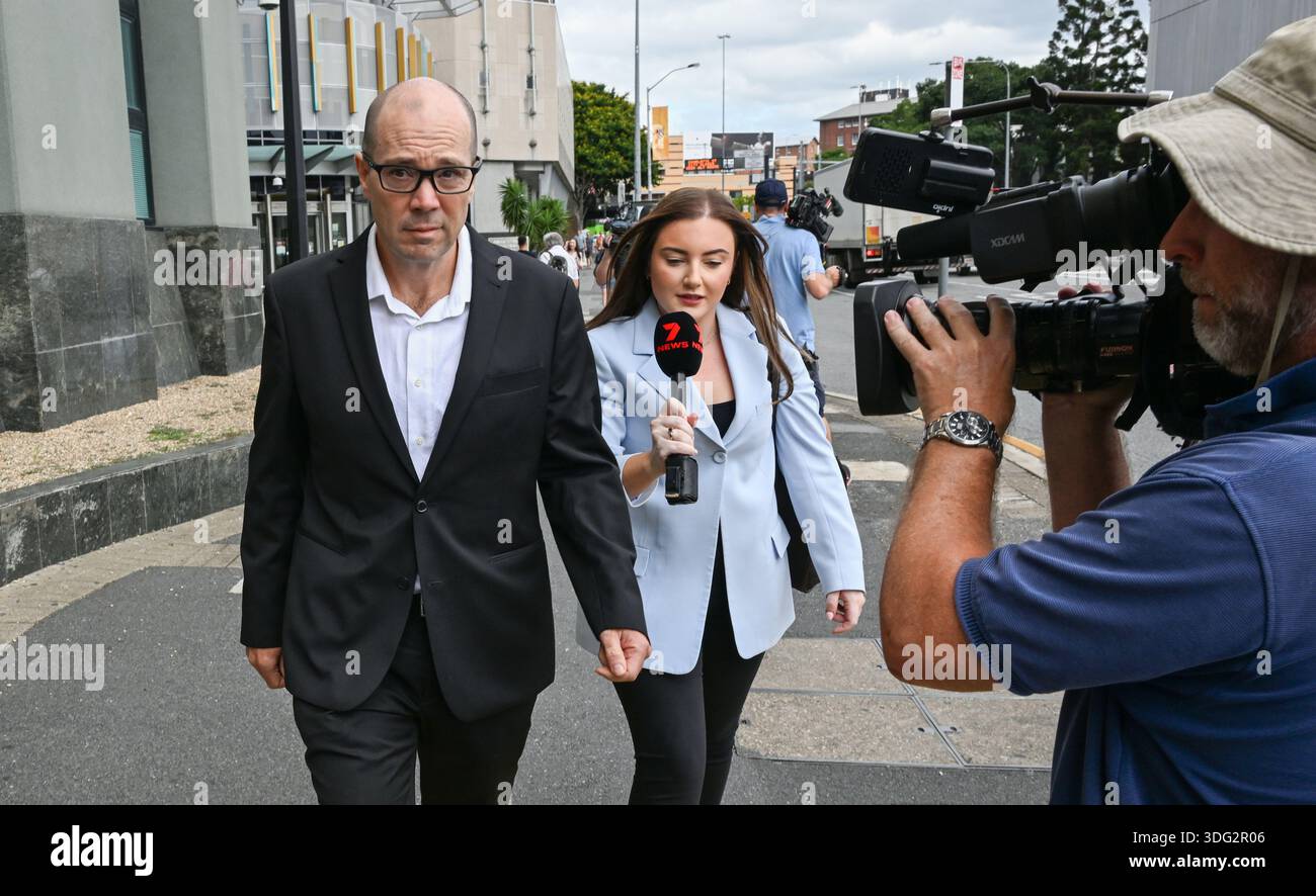 Neurosurgeon Richard William Laherty (left) is seen leaving the ...