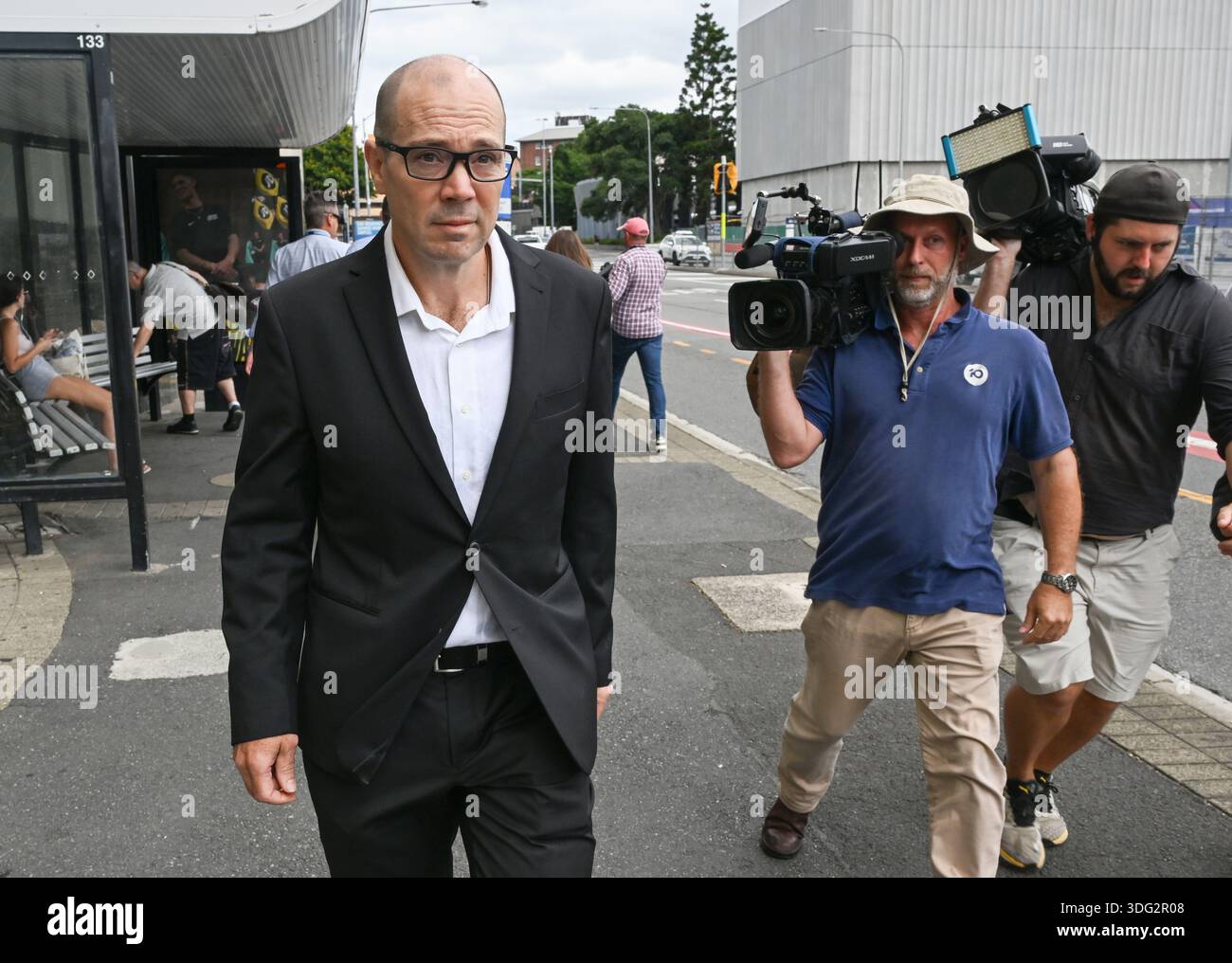 Neurosurgeon Richard William Laherty (left) is seen leaving the ...