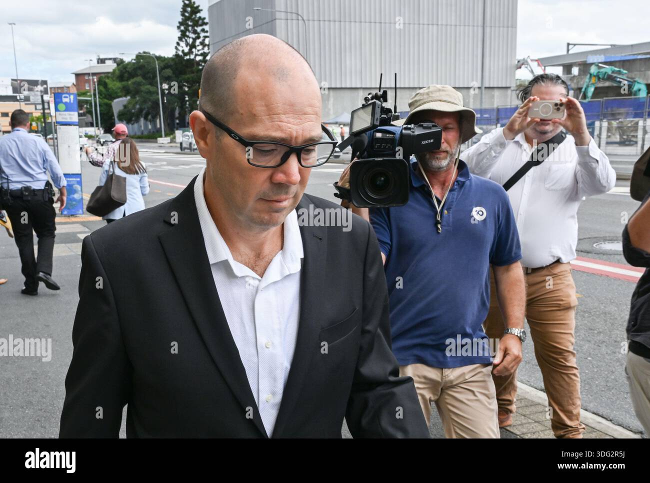 Neurosurgeon Richard William Laherty (left) is seen leaving the ...