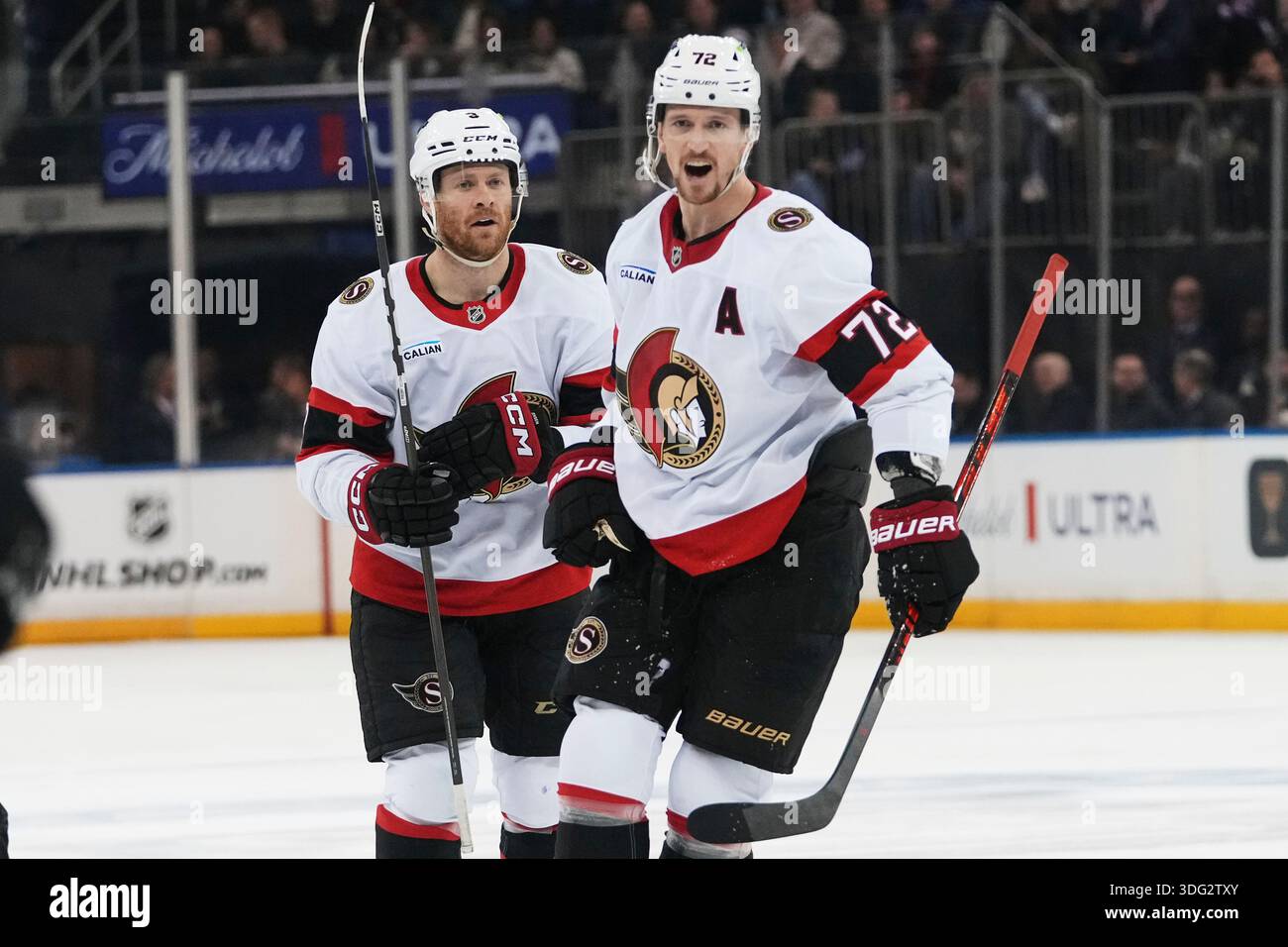 Ottawa Senators' Nick Jensen, left, celebrates with Thomas Chabot (72 ...