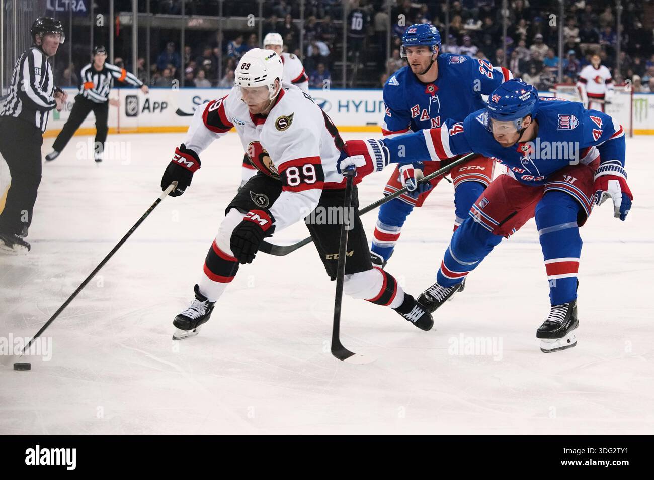 Ottawa Senators' Lars Eller (89) fights for control with New York ...