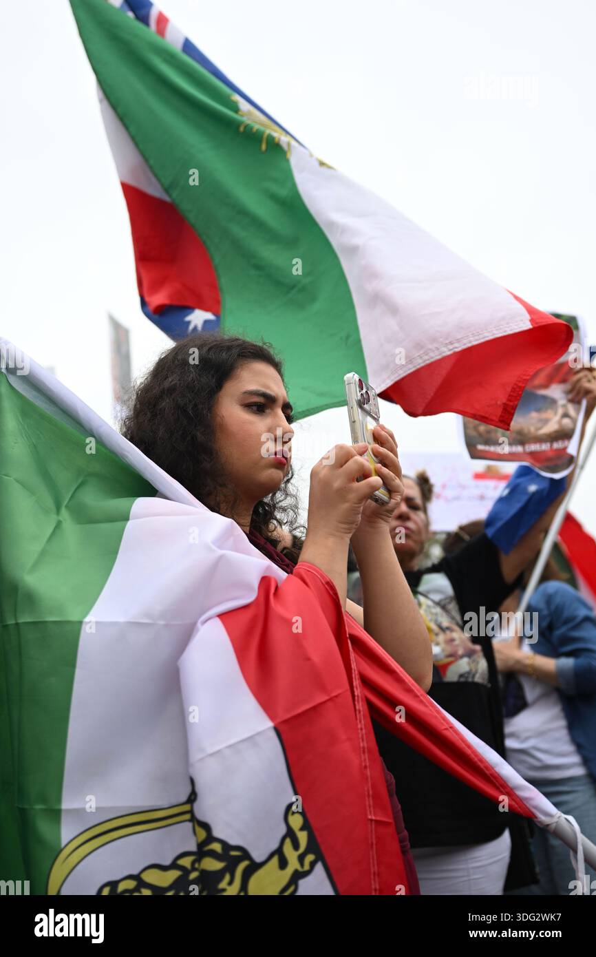 An anti regime protester attends a rally outside the Iranian Embassy in ...