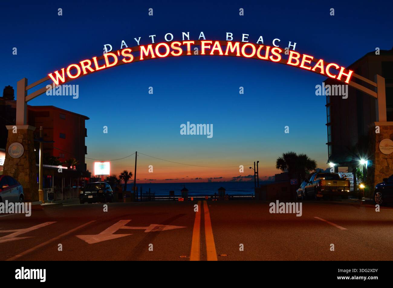 An illuminated sign near the ocean welcomes visitors to the Worlds Most ...