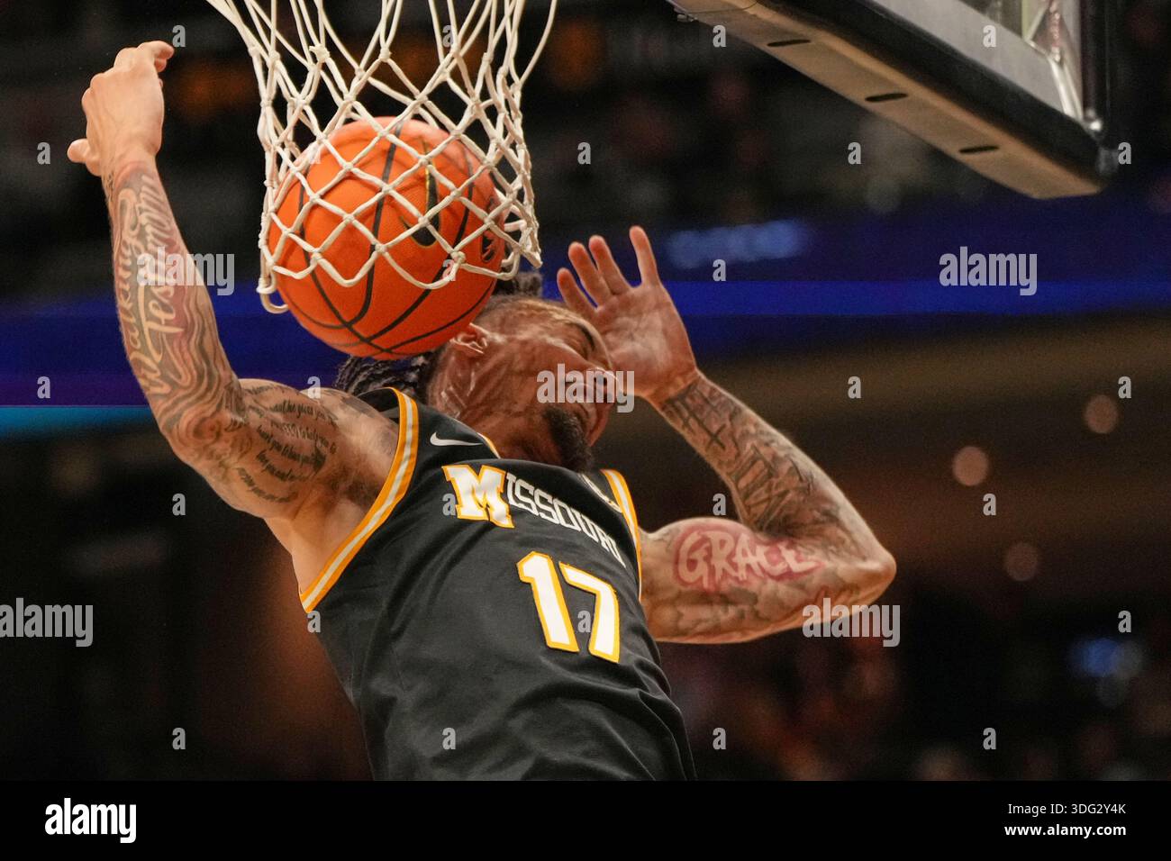 Missouri's Jayden Stone dunks during the second half of an NCAA college ...