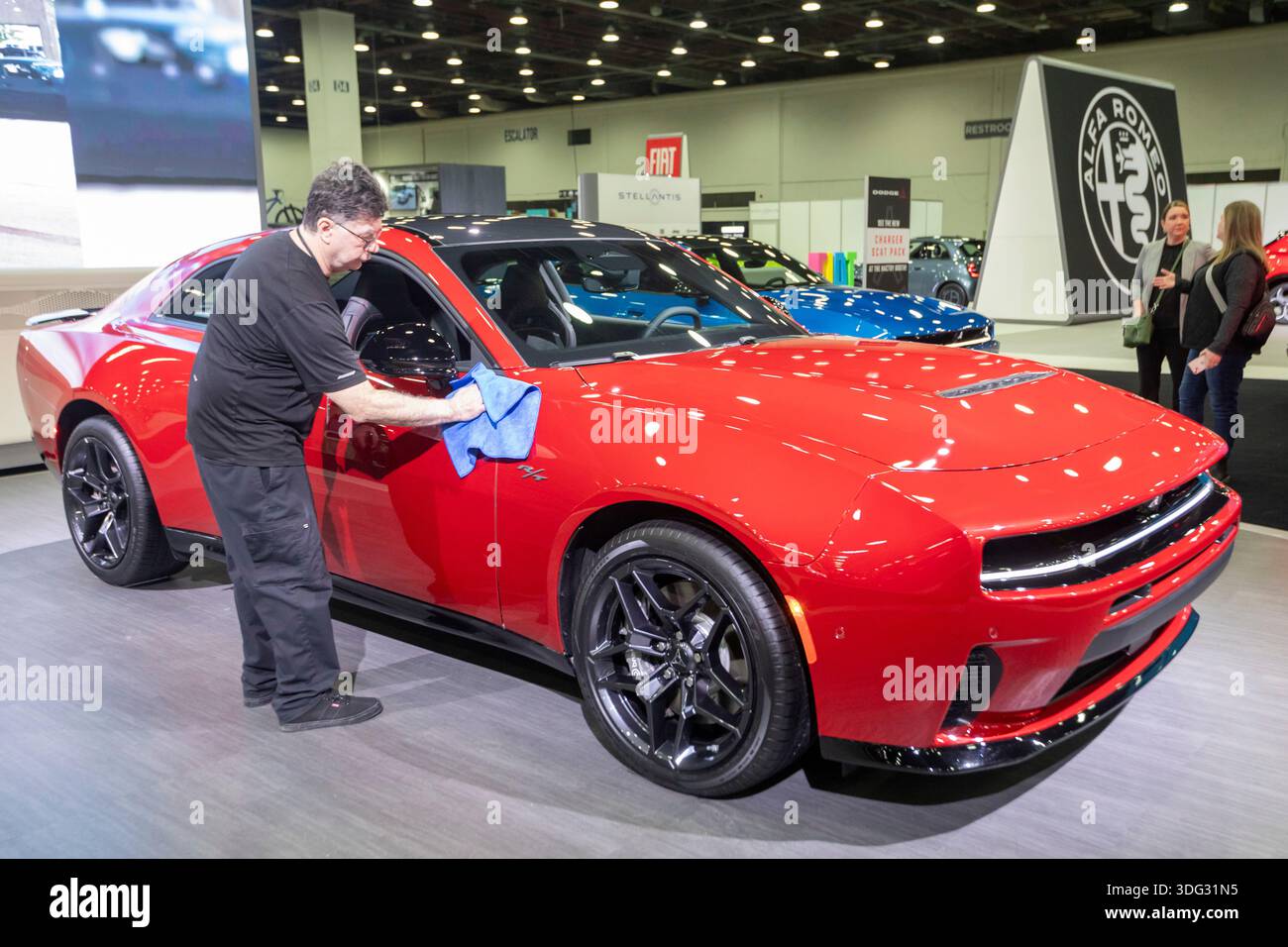 Detroit, Michigan USA - 14 January 2026 - A worker polishes the Dodge ...