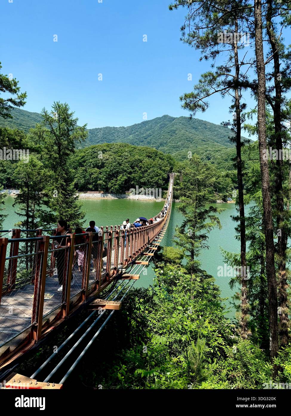 Majang Reservoir Red Suspension Bridge Stock Photo - Alamy
