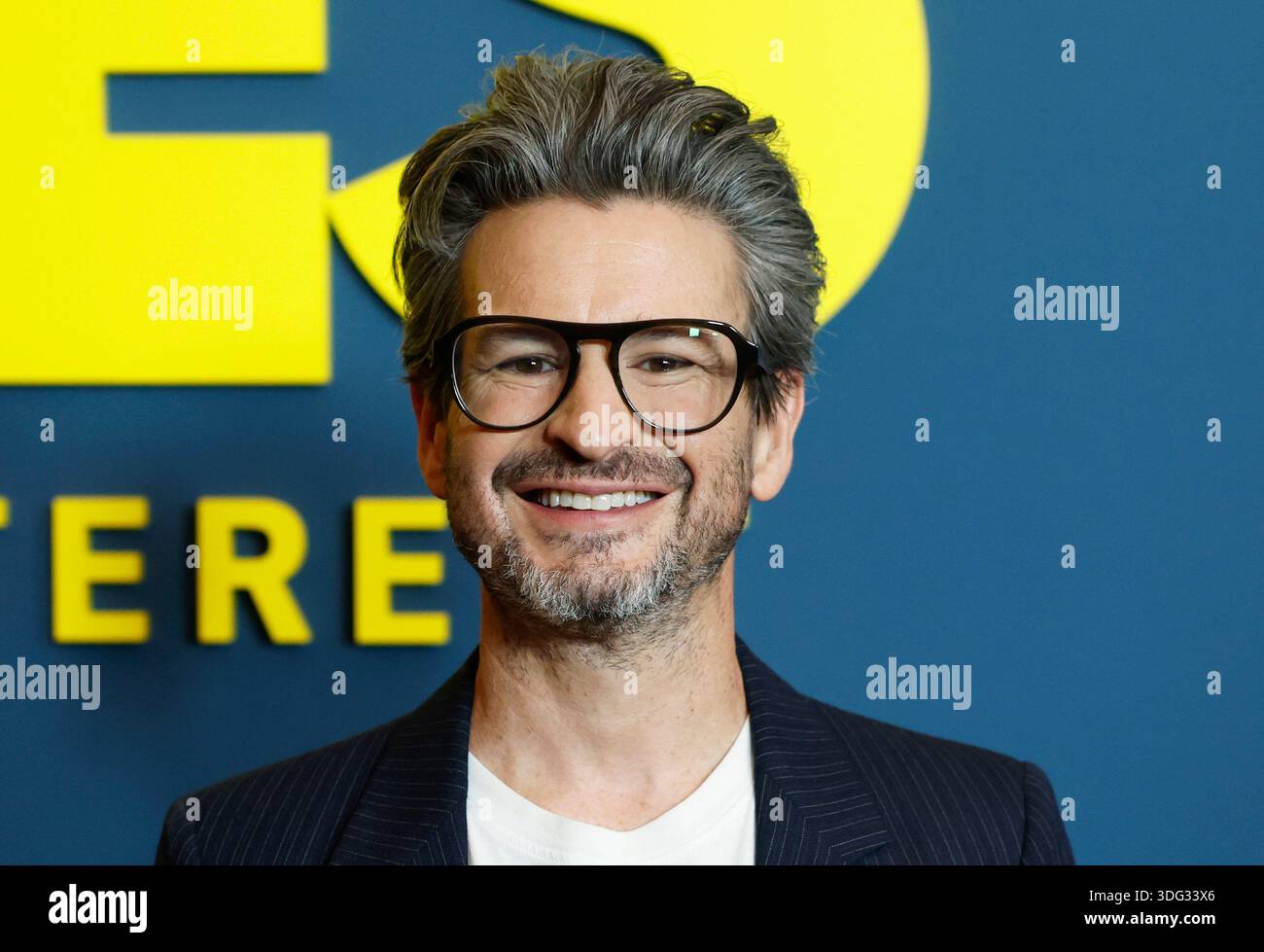 David Iserson arrives on the red carpet for Peacock's "Ponies" New York ...