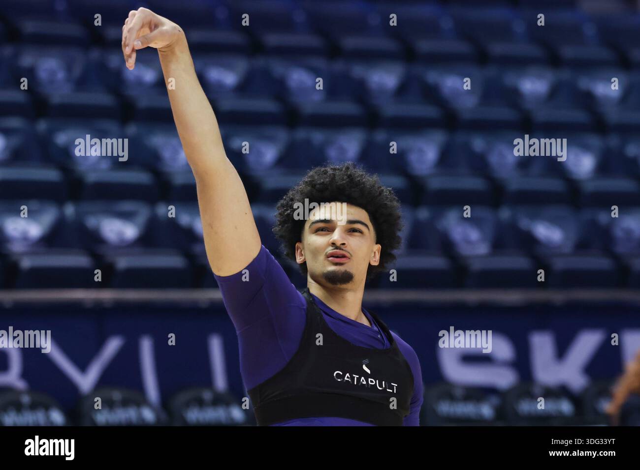 TCU forward David Punch warms up before an NCAA basketball game against ...