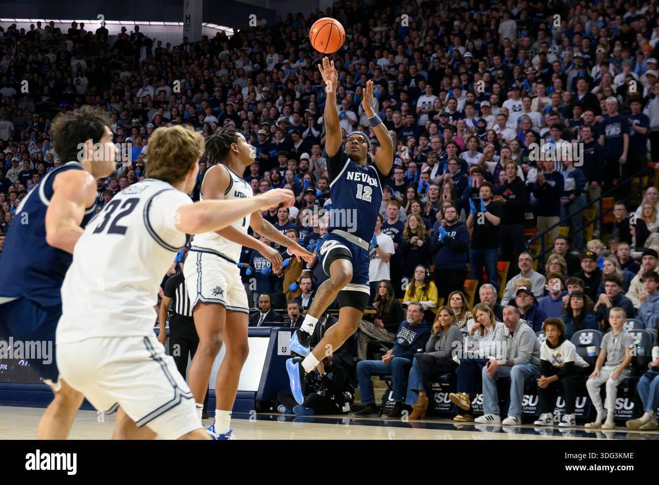 Nevada guard Tayshawn Comer (12) shoots and makes a halftime buzzer ...