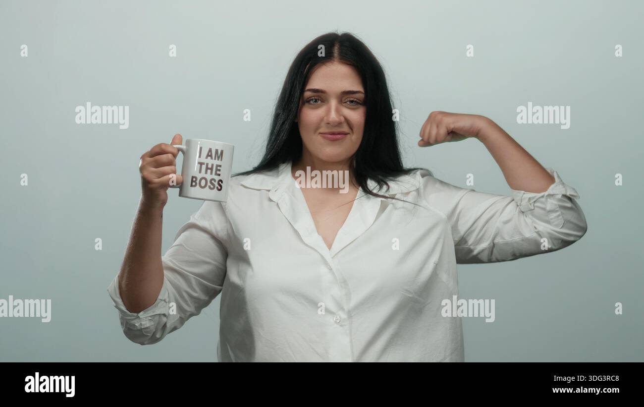 Woman flexing mug labeled hi-res stock photography and images - Alamy