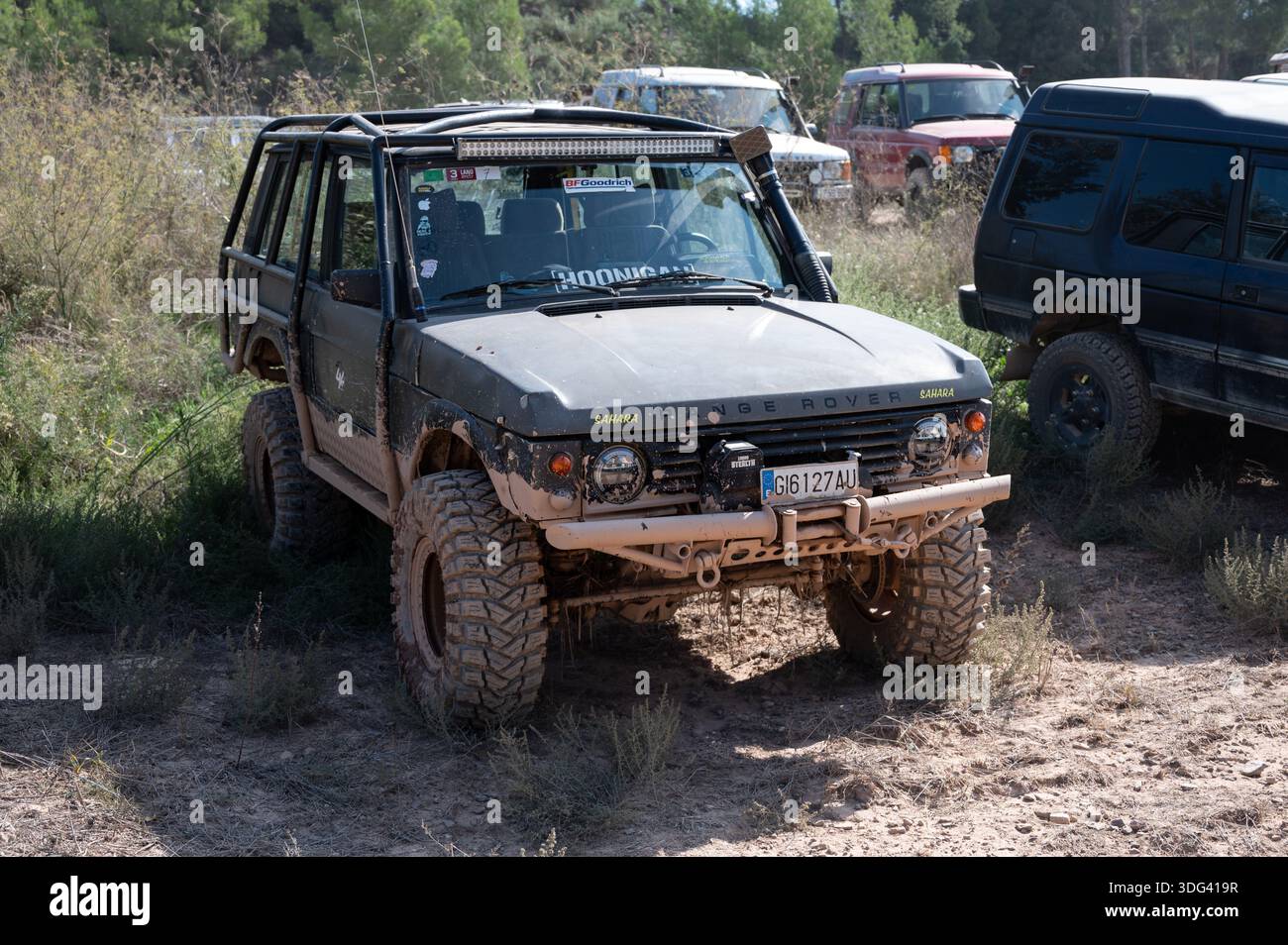 Modified matte black Land Rover Range Rover Classic with external roll ...