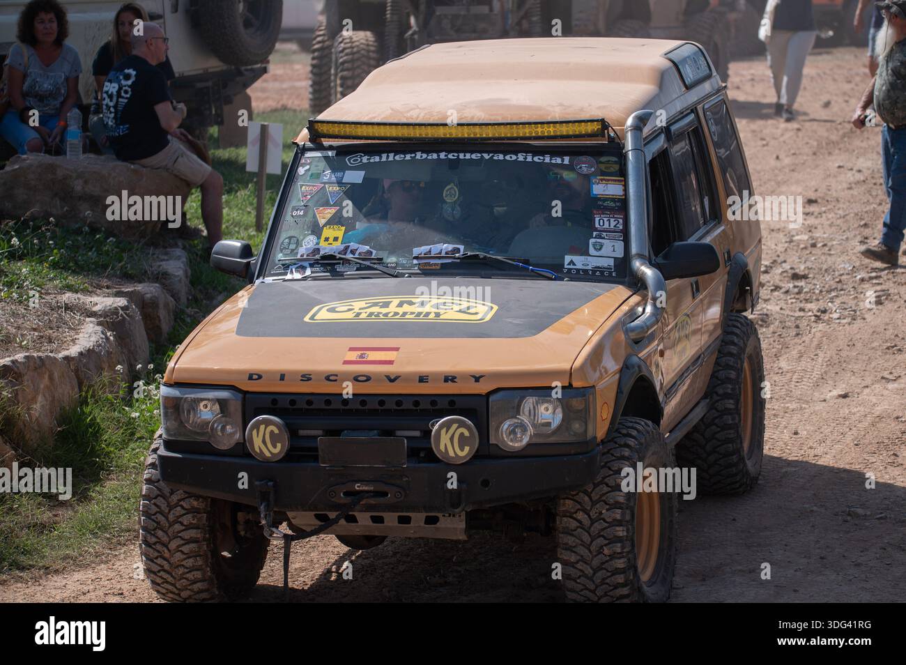 Front view of a modified yellow Land Rover Discovery Series II on a ...