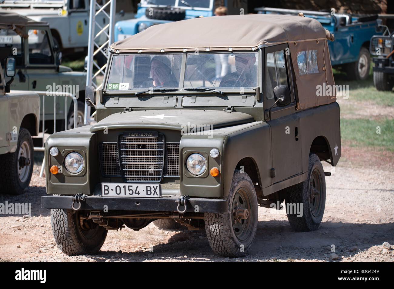Front three-quarter view of a vintage olive green Land Rover Santana ...