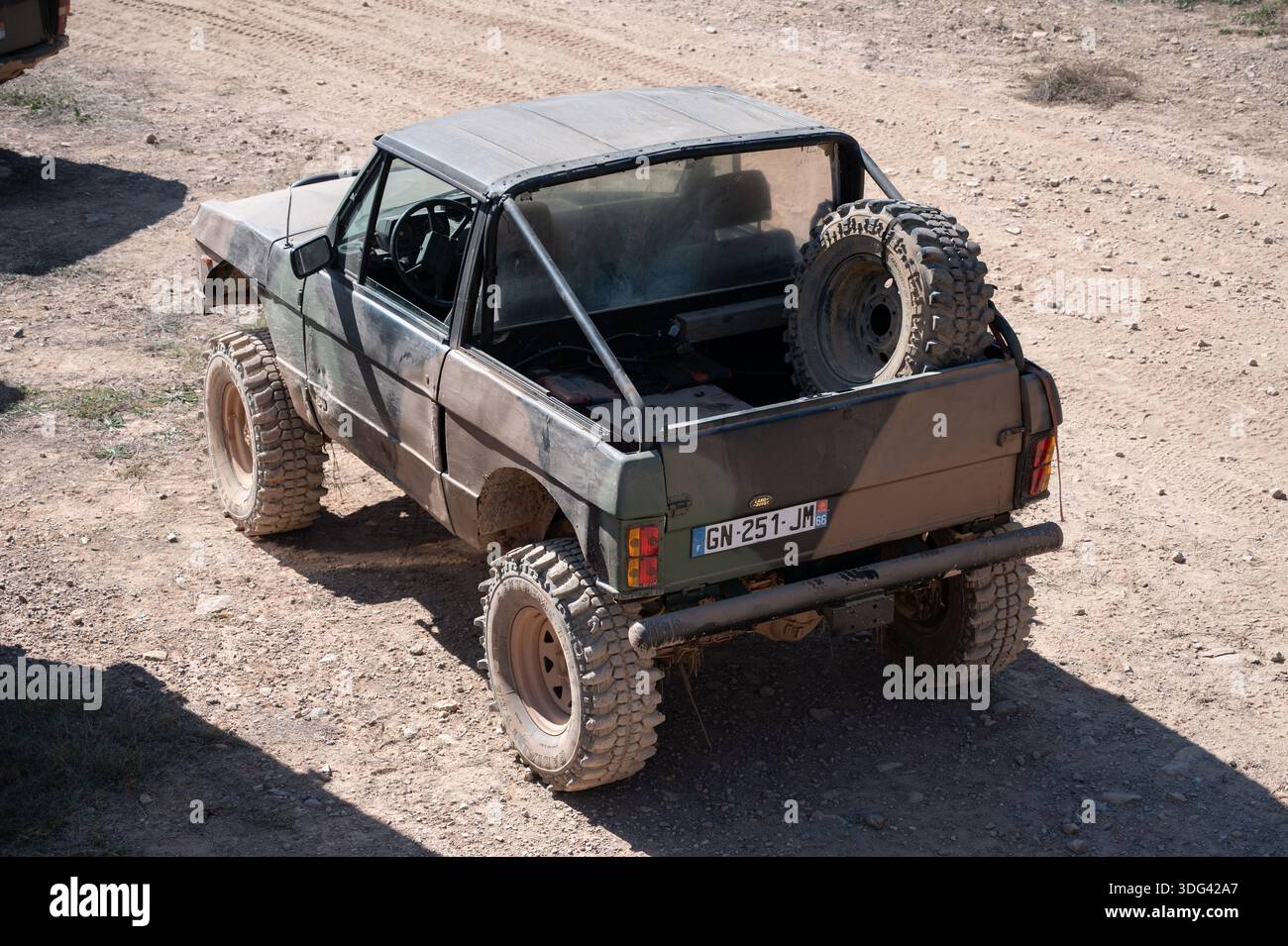 High angle rear view of a modified Range Rover Classic. Features ...