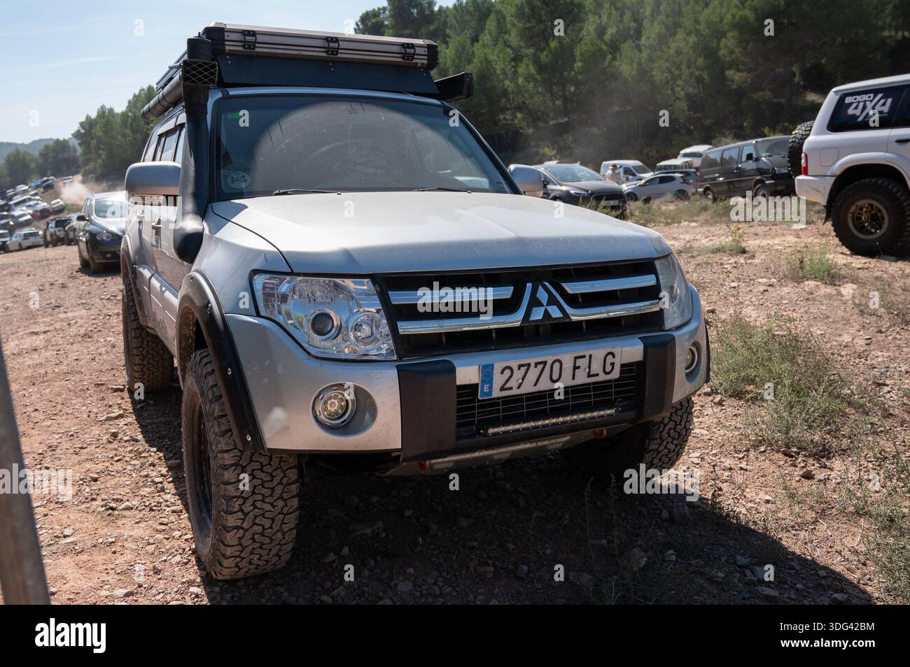 Front view of a silver Mitsubishi Montero V80 modified for off-roading ...