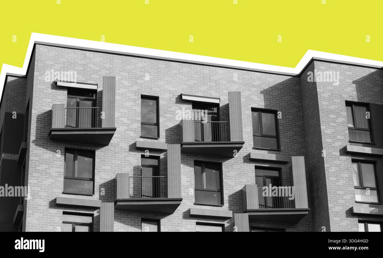 Black and white architectural facade with brick walls, balconies, and ...