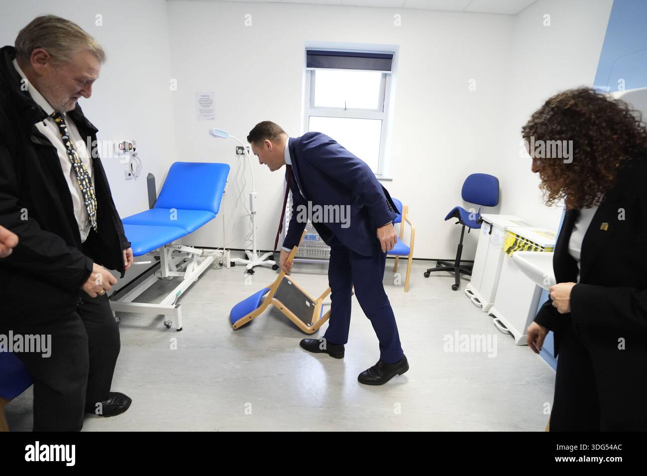 Health Secretary Wes Streeting picks up a chair during an NHS data day ...