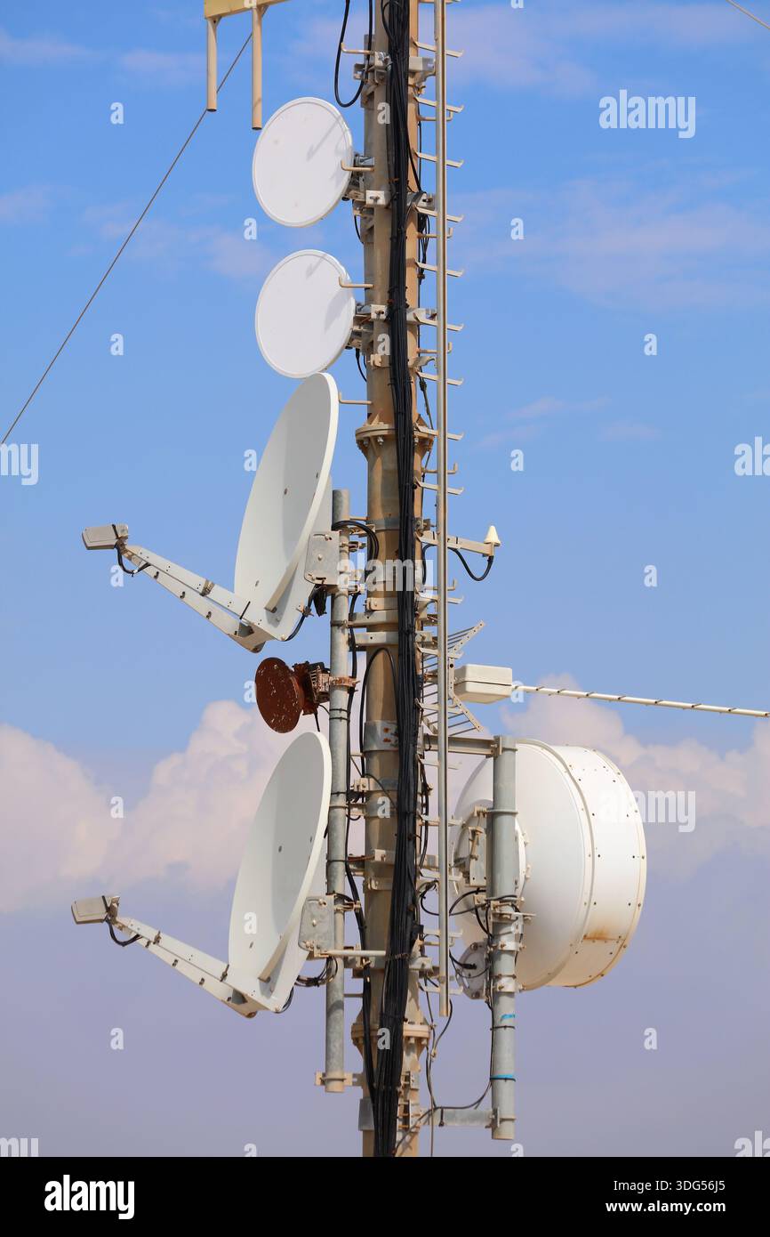 Telecom base station in Alicante, Spain. Cell tower satellite dishes ...