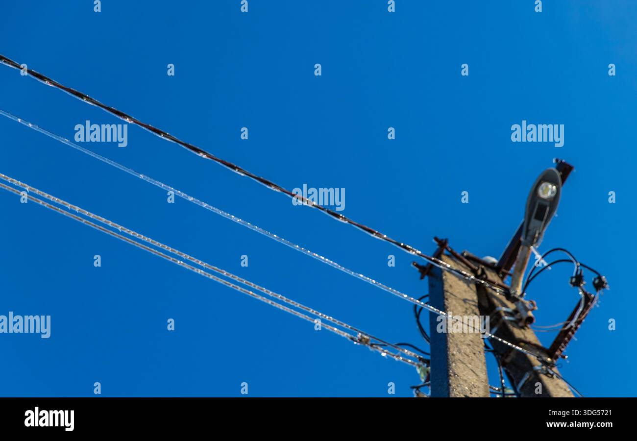 Wires frozen in ice. Selective focus. nature Stock Photo - Alamy