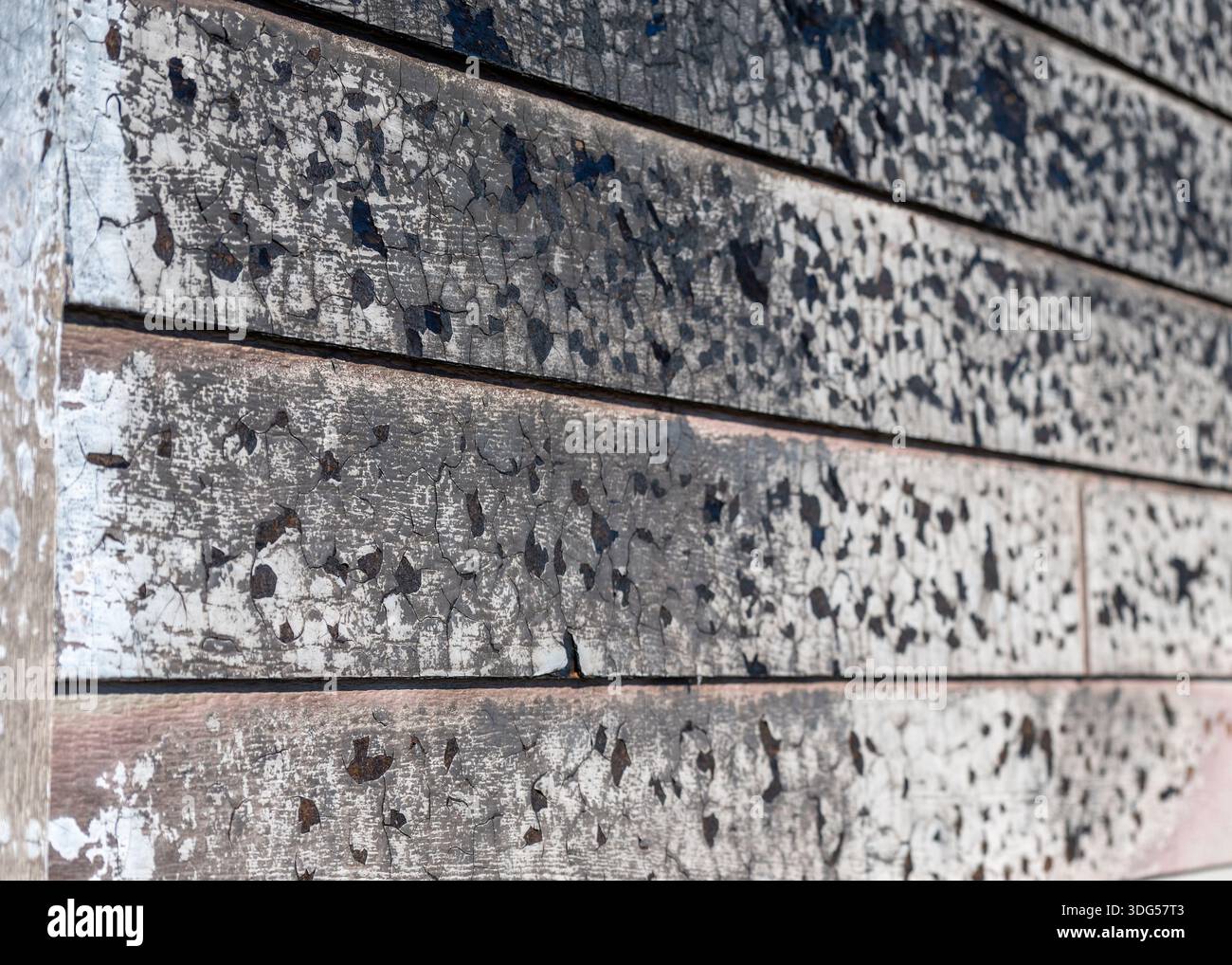 Extensive smoke damage on the exterior wall of a residential building ...
