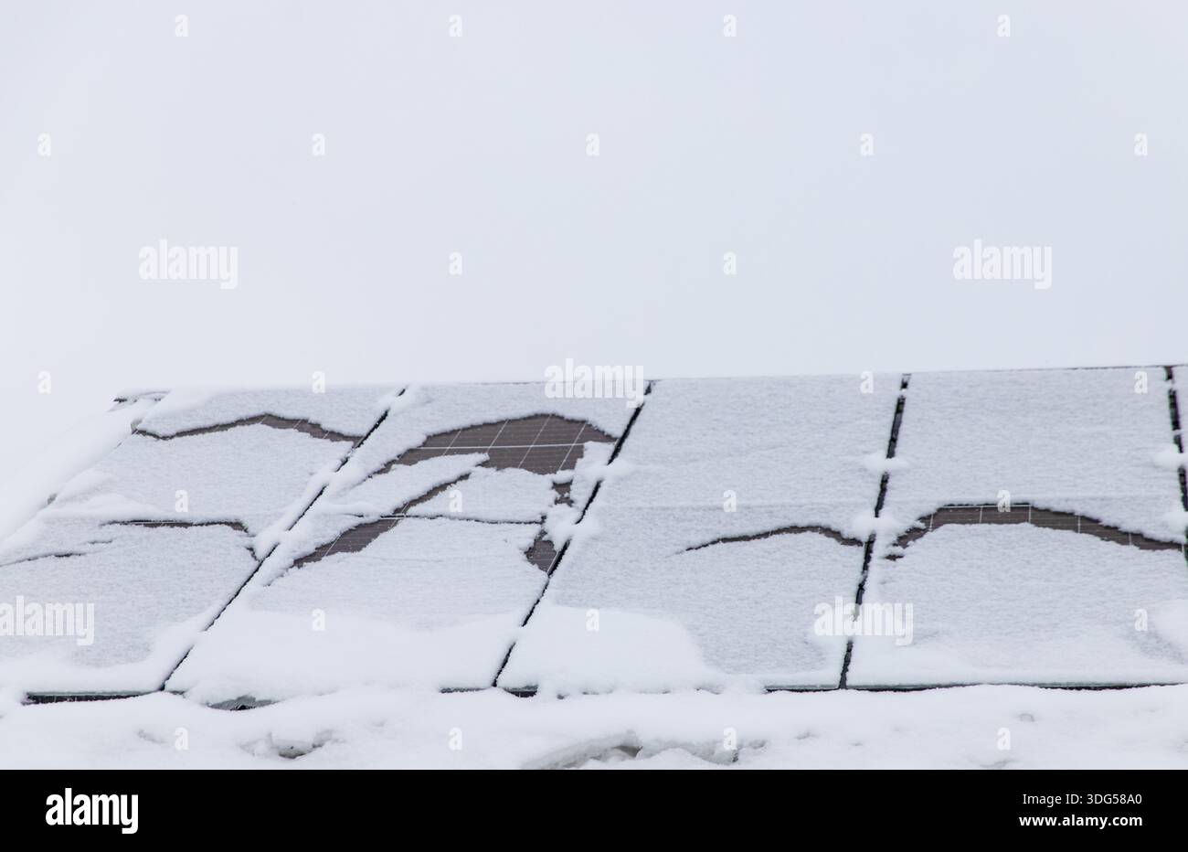 Solar panels in the snow. Selective focus. nature Stock Photo - Alamy